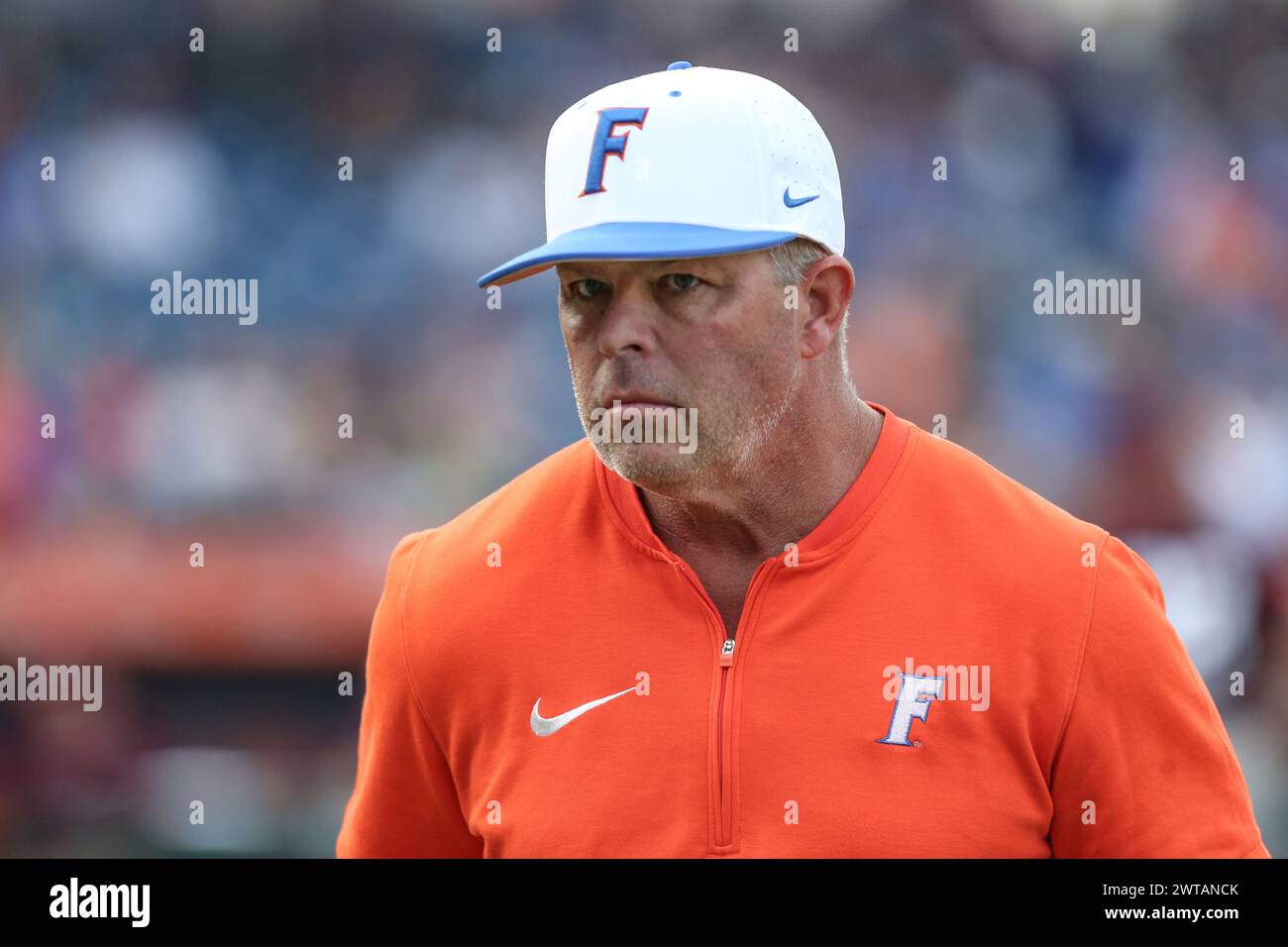 Florida head coach Kevin O'Sullivan meets with officials before an NCAA ...