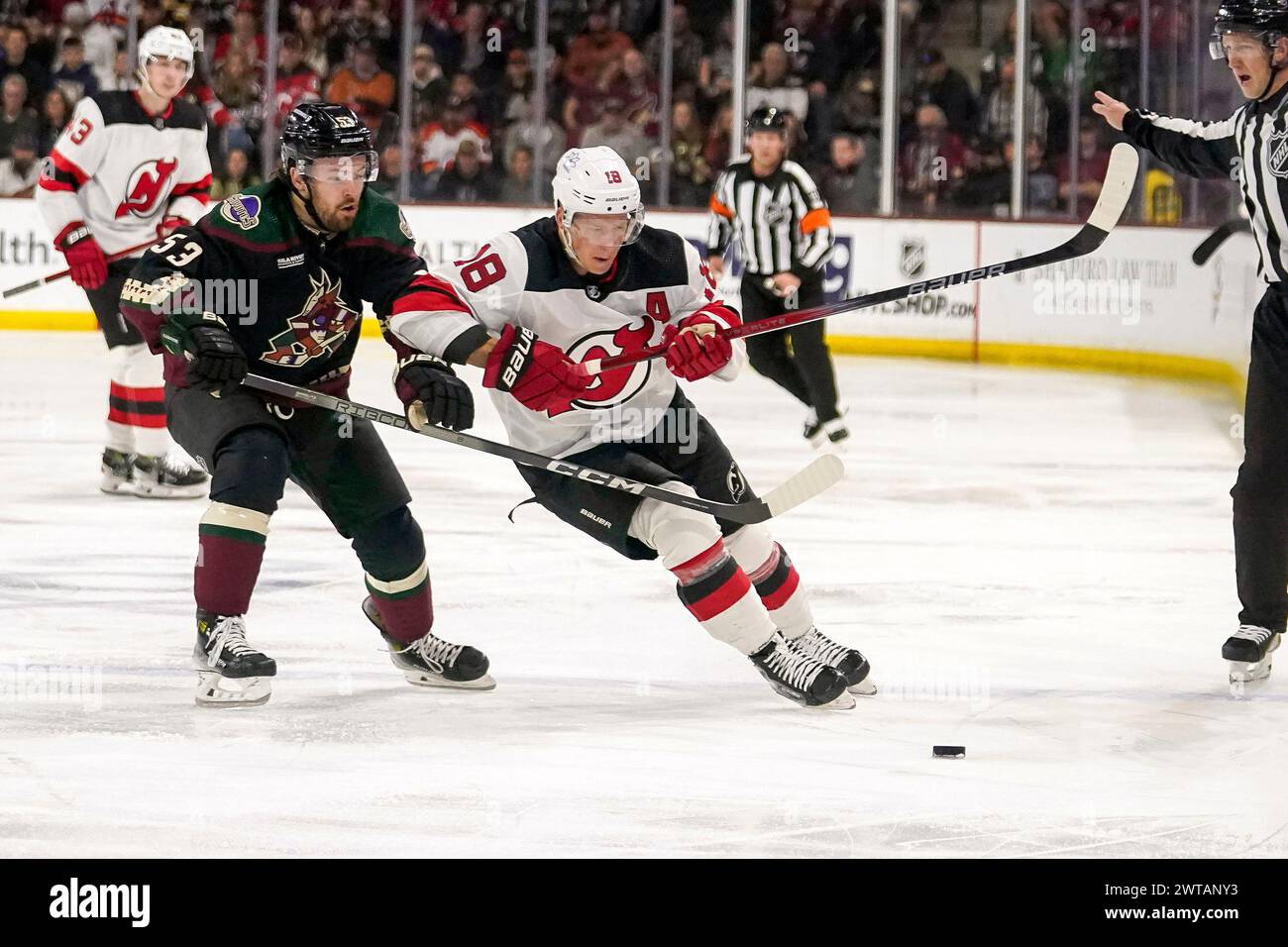 Arizona Coyotes left wing Michael Carcone and New Jersey Devils left ...