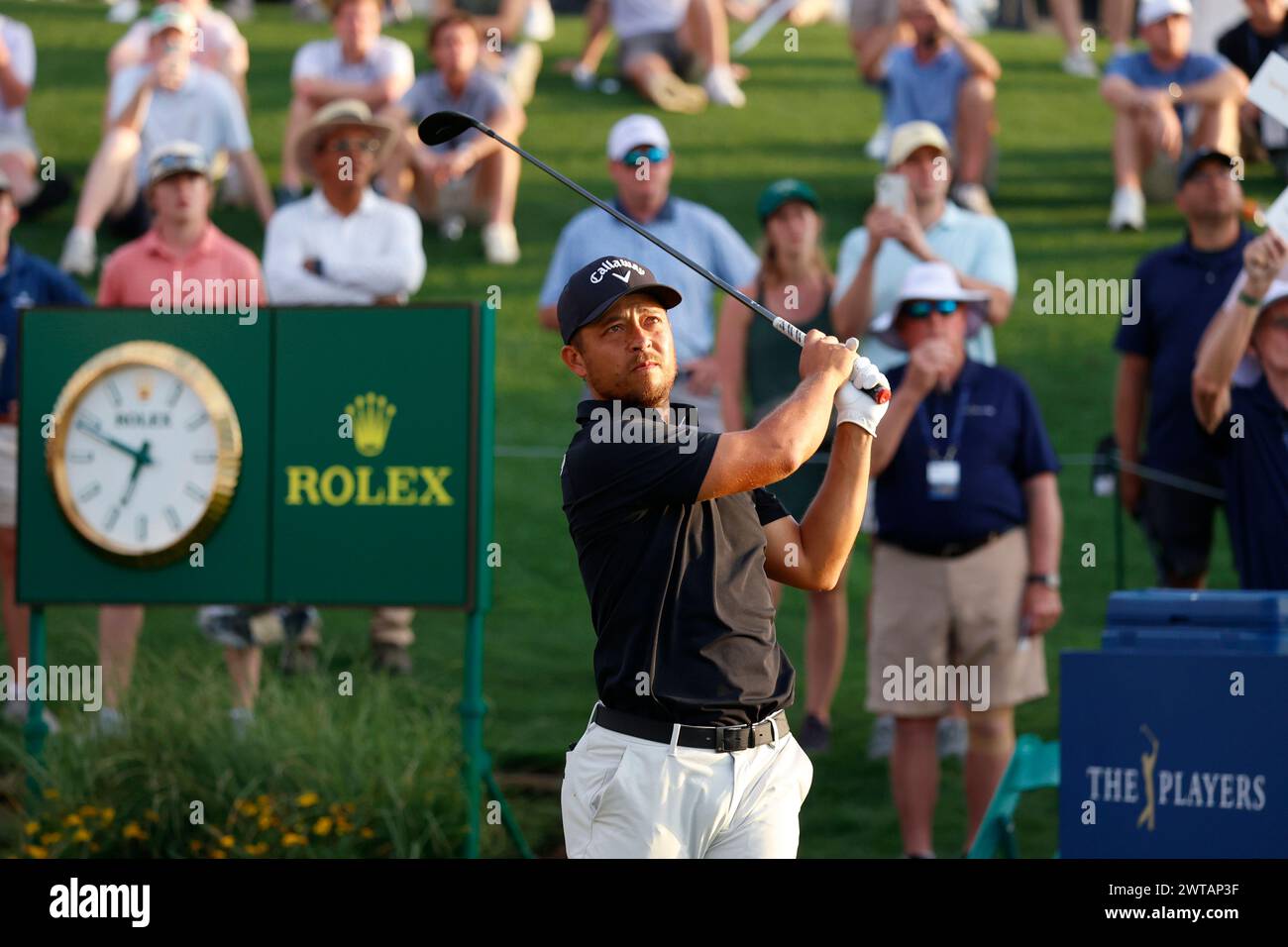 PONTE VEDRA BEACH, FL - MARCH 16: PGA golfer Xander Schauffele plays his tee shot on the 18th ...