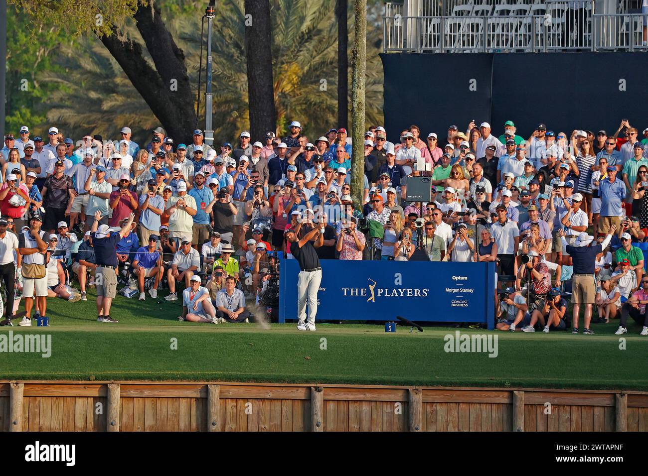 PONTE VEDRA BEACH, FL - MARCH 16: PGA golfer Xander Schauffele plays his tee shot on the 17th ...