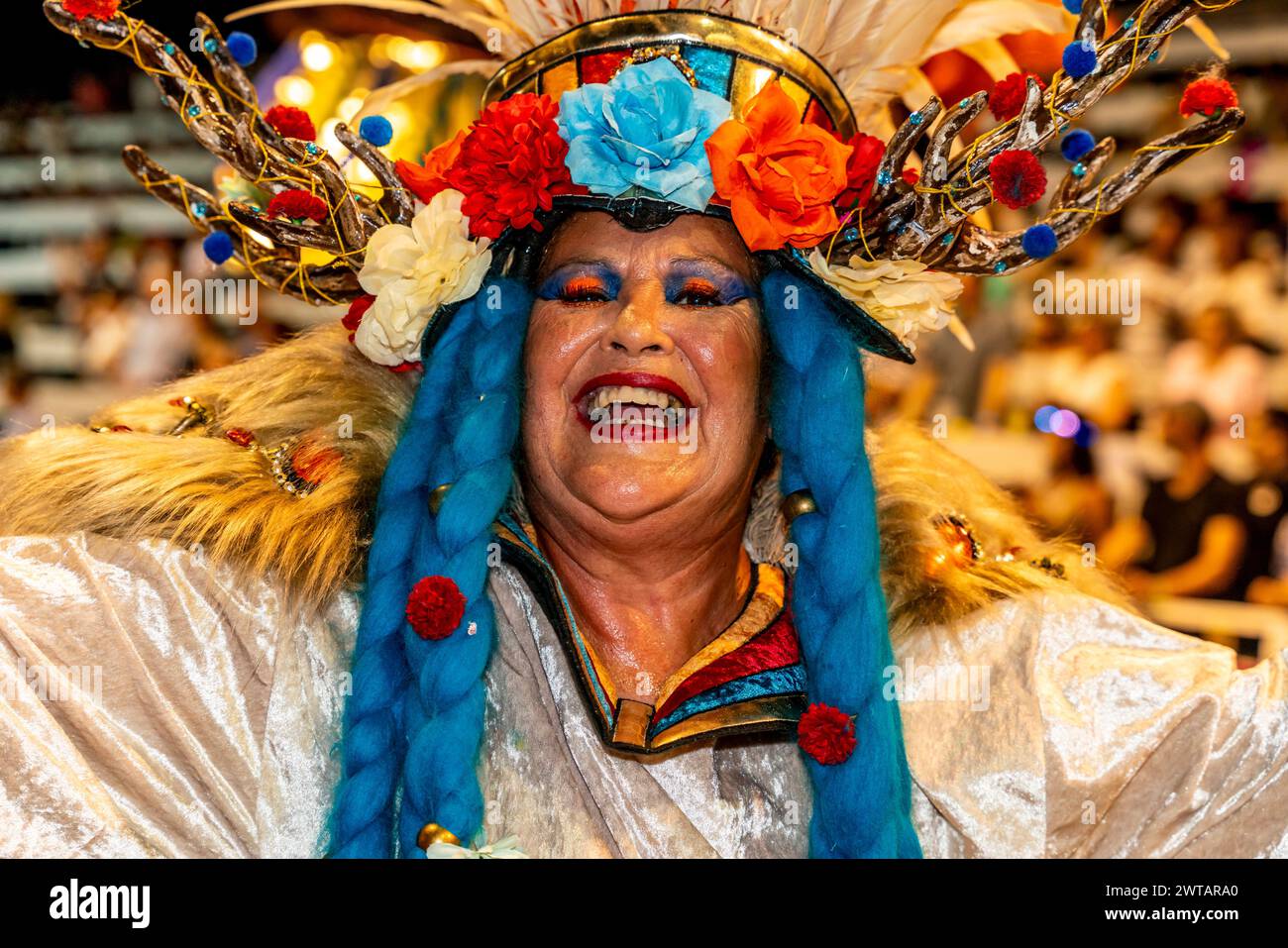 A Local Woman In Costume Takes Part In The Annual Carnaval del Pais ...