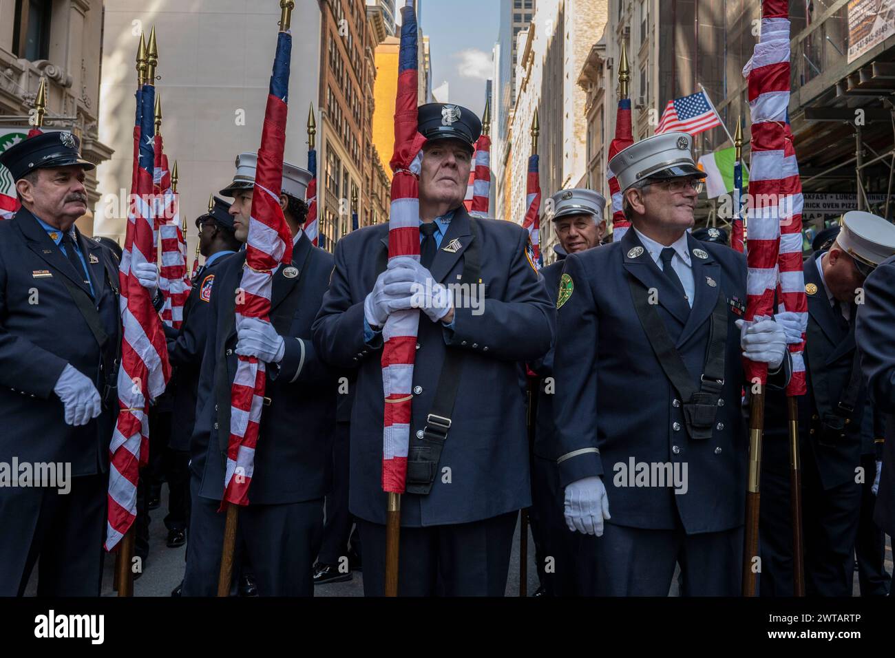 New York, New York, USA. 16th Mar, 2024. NYFD carrying the 343 US Flags ...