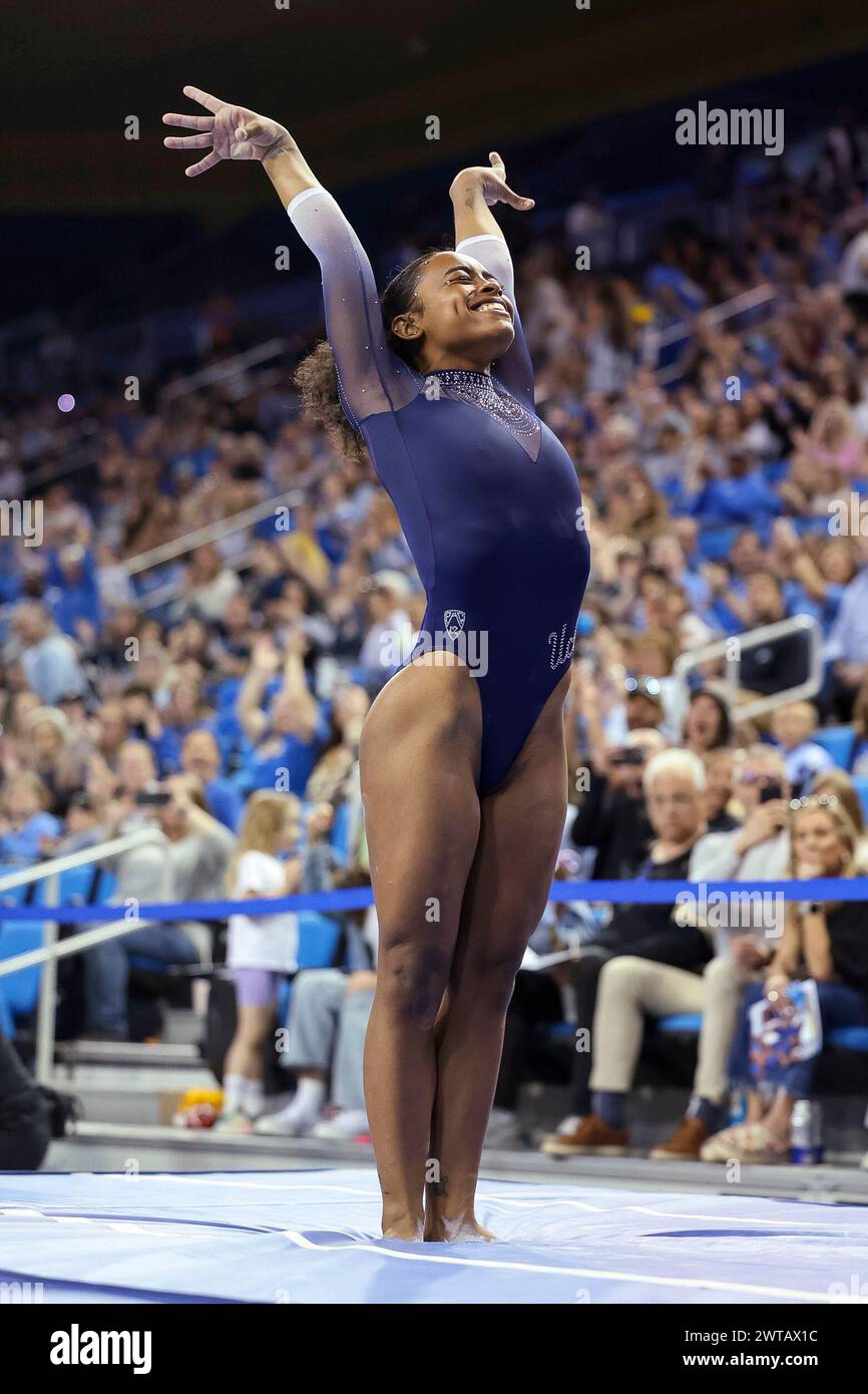 UCLA's Selena Harris reacts after performing a vault during the team's ...