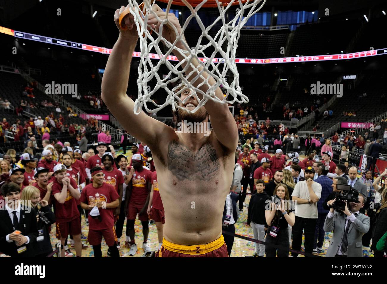 Iowa State forward Conrad Hawley cuts the net after an NCAA college ...