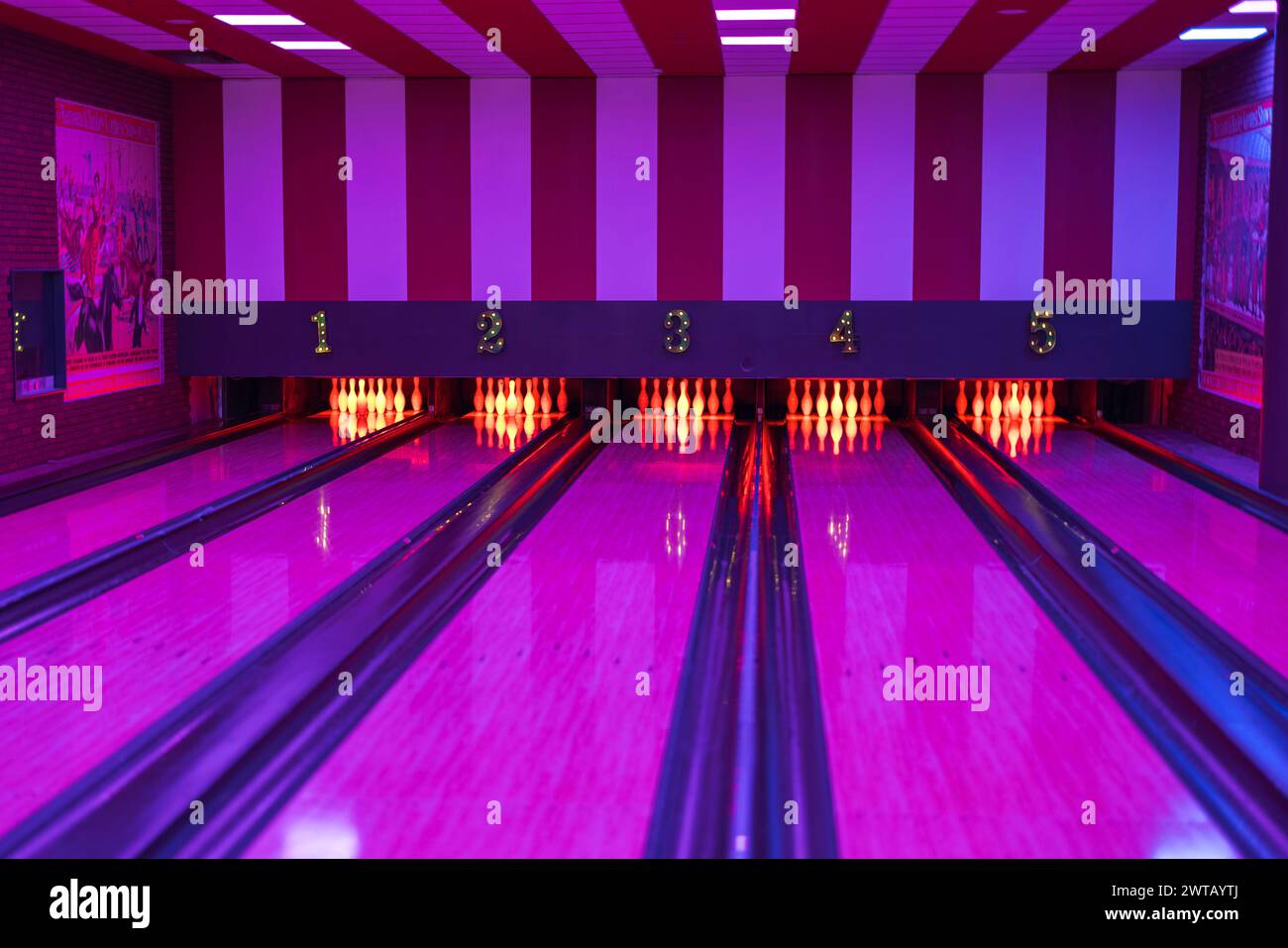 Perspective of the bowling alley's interior, showcasing the pins and ...