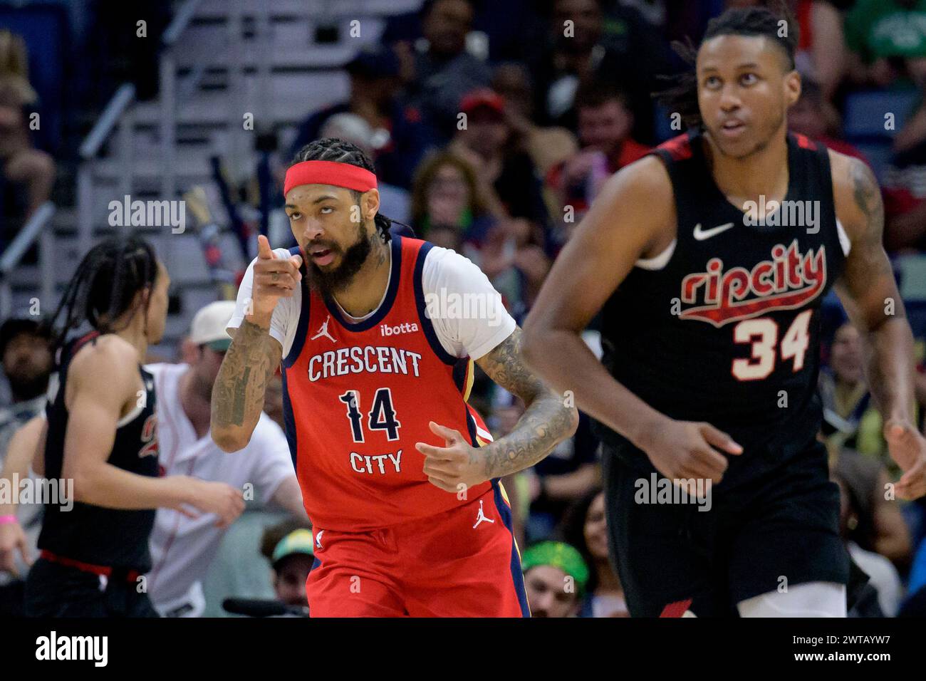 New Orleans Pelicans forward Brandon Ingram (14) celebrates after a ...