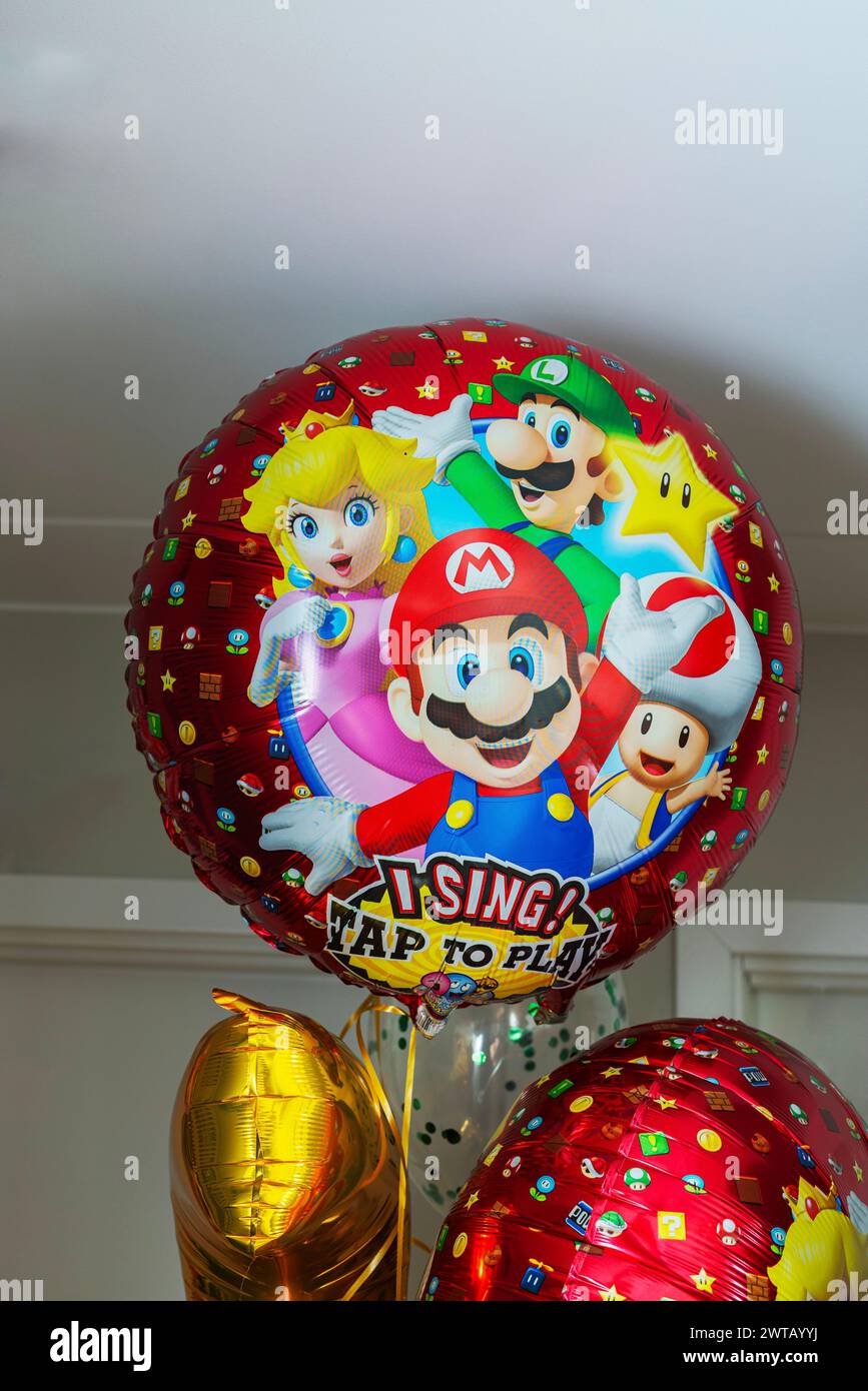 Beautiful view of balloons filled with gel and featuring cartoon ...