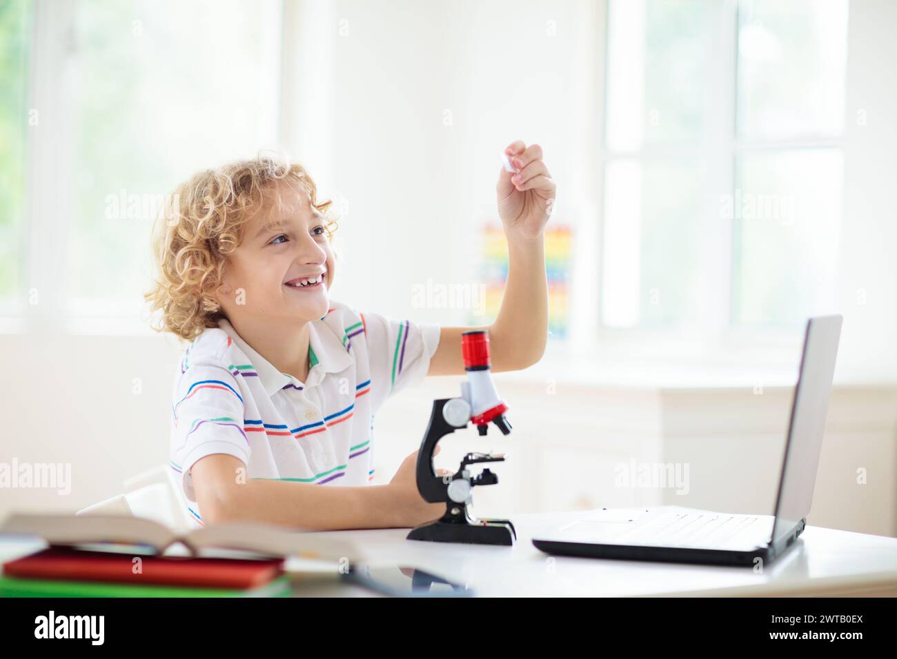 School kids with microscope. Science class. Children making biology or ...