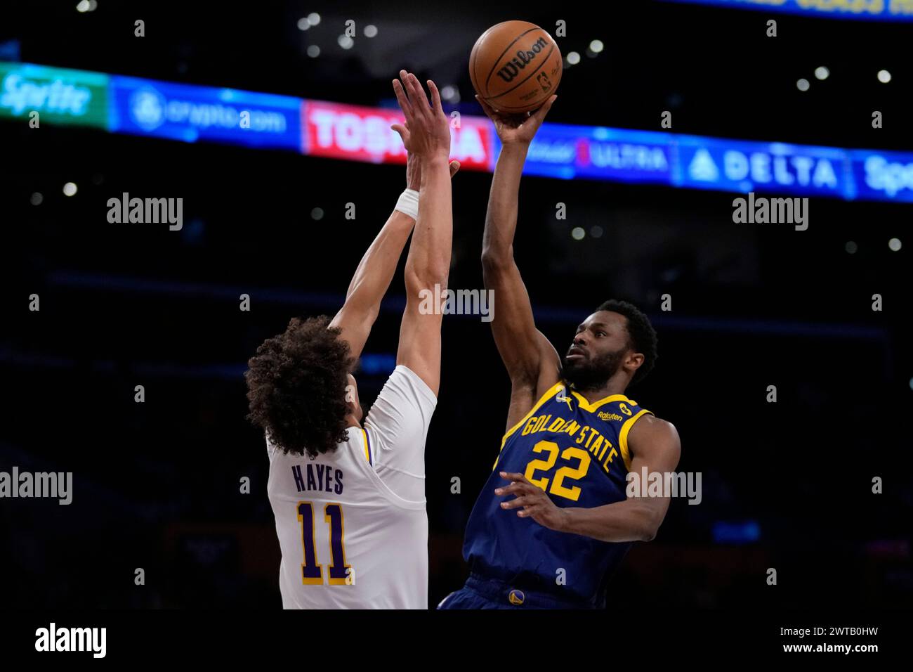 Golden State Warriors forward Andrew Wiggins (22) shoots against Los Angeles Lakers center ...