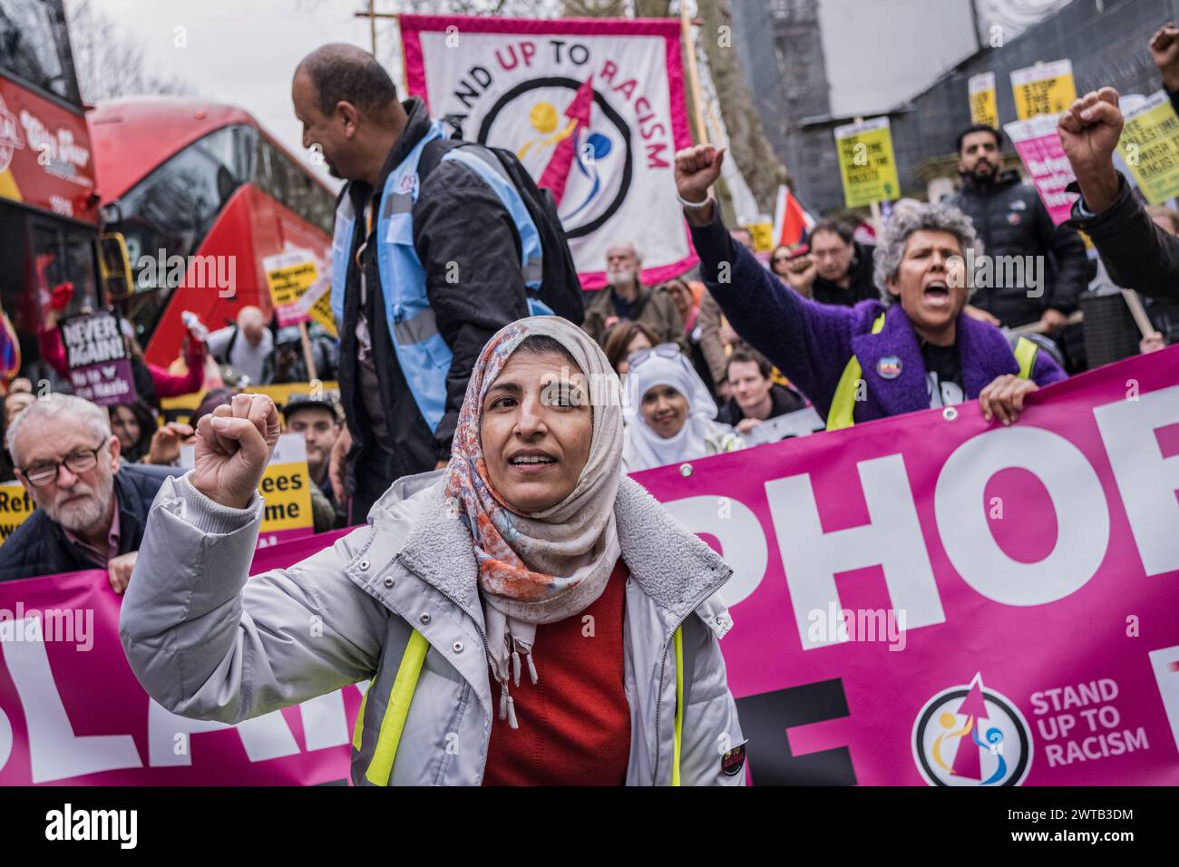London, UK. 16th Mar, 2024. The anti-racism protestors march through ...