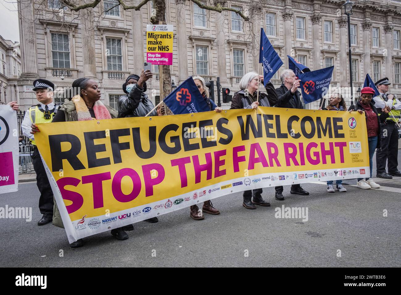 A group of protestors seen holding a banner during the demonstration ...