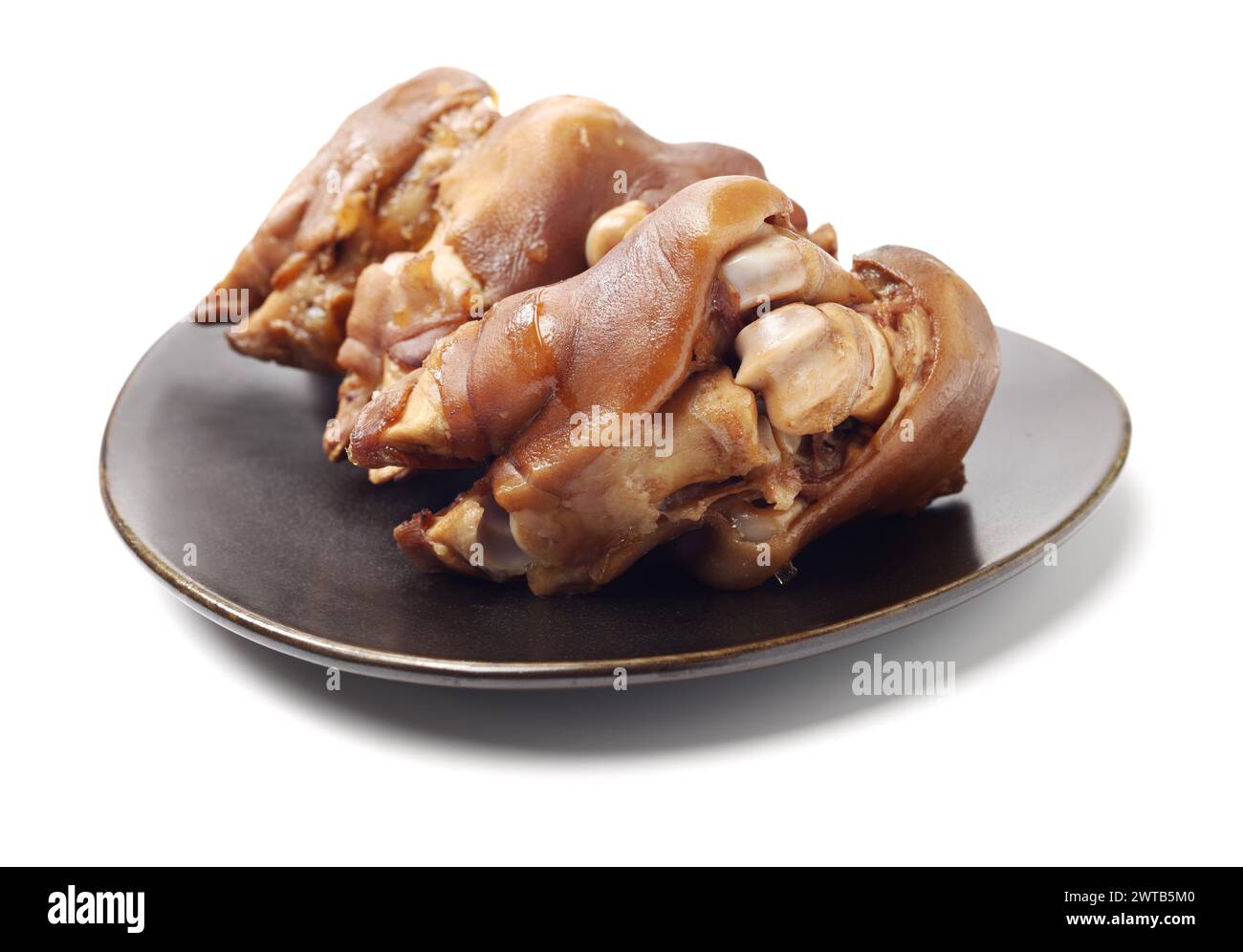 fresh pig trotter on white background Stock Photo - Alamy