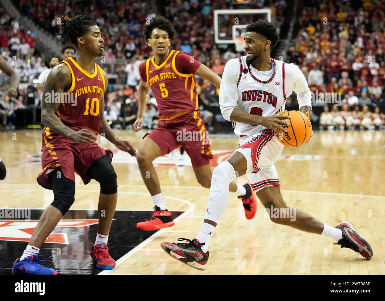 MAR 16 2024: Houston Cougars guard Mylik Wilson (8) drives against Iowa ...