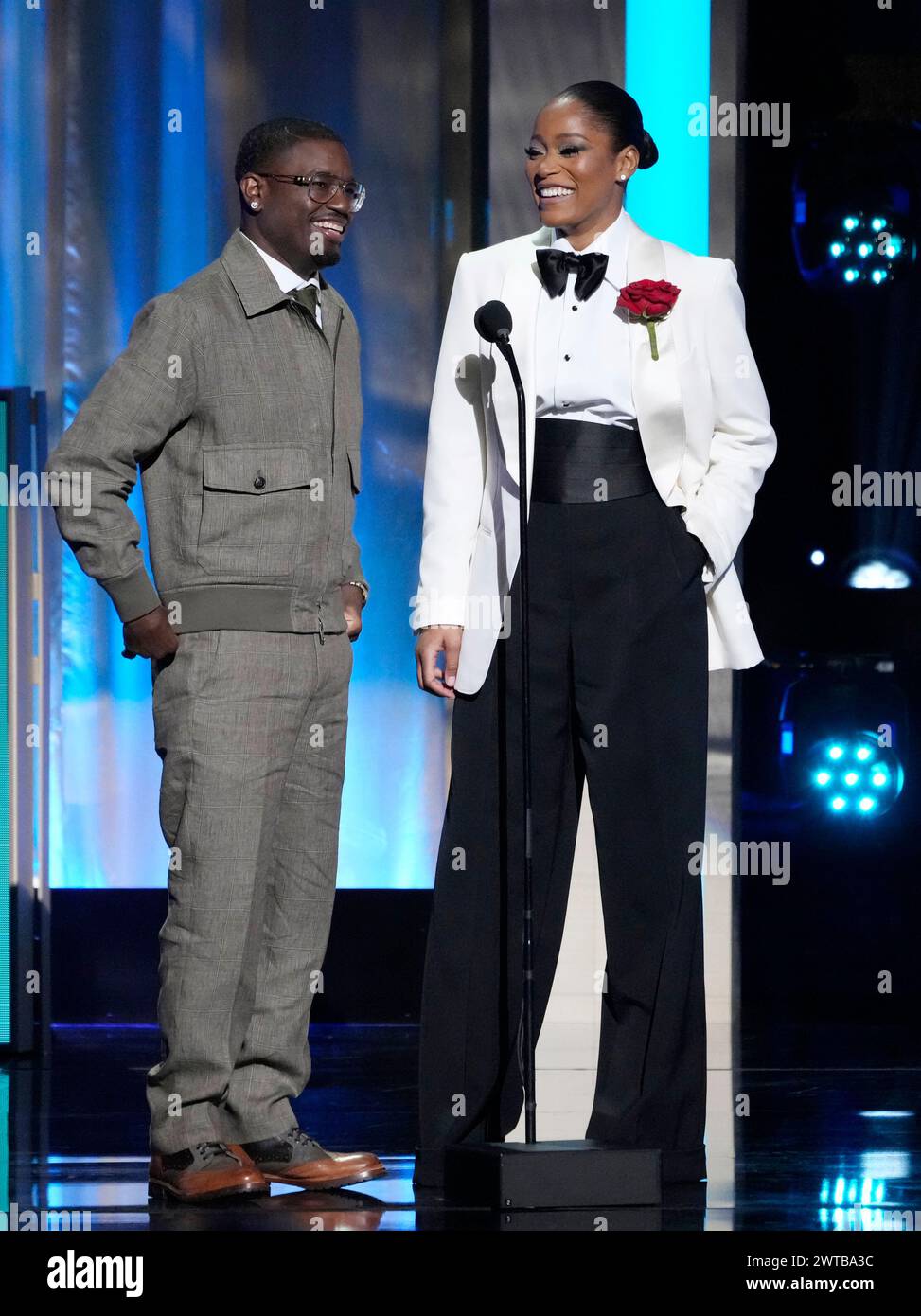Presenters Lil Red Howery, left, and Keke Palmer share a laugh onstage ...