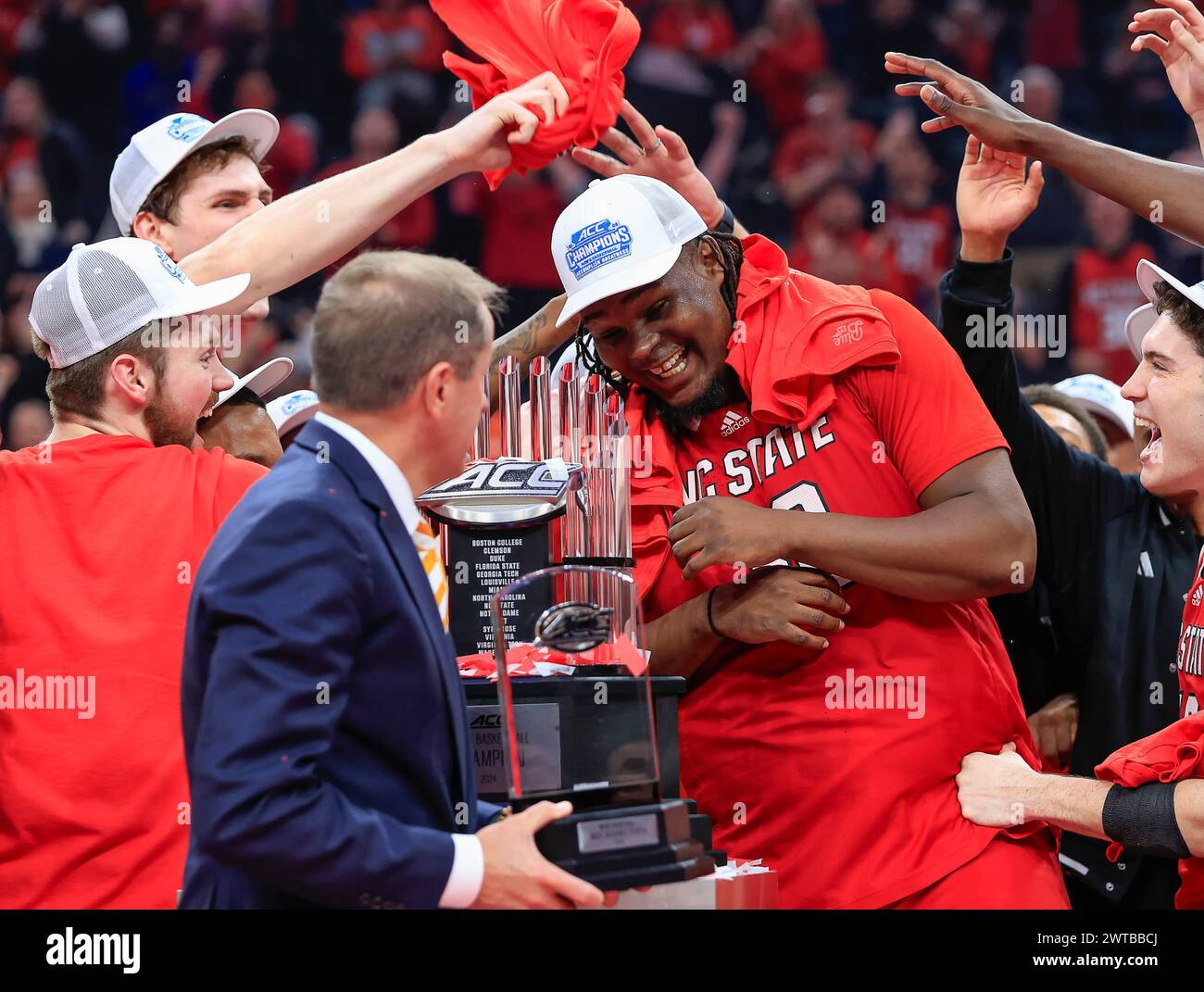 March 16, 2024: NC State Wolfpack Forward (30) DJ Burns, Jr. is shocked to receive the MVP ...
