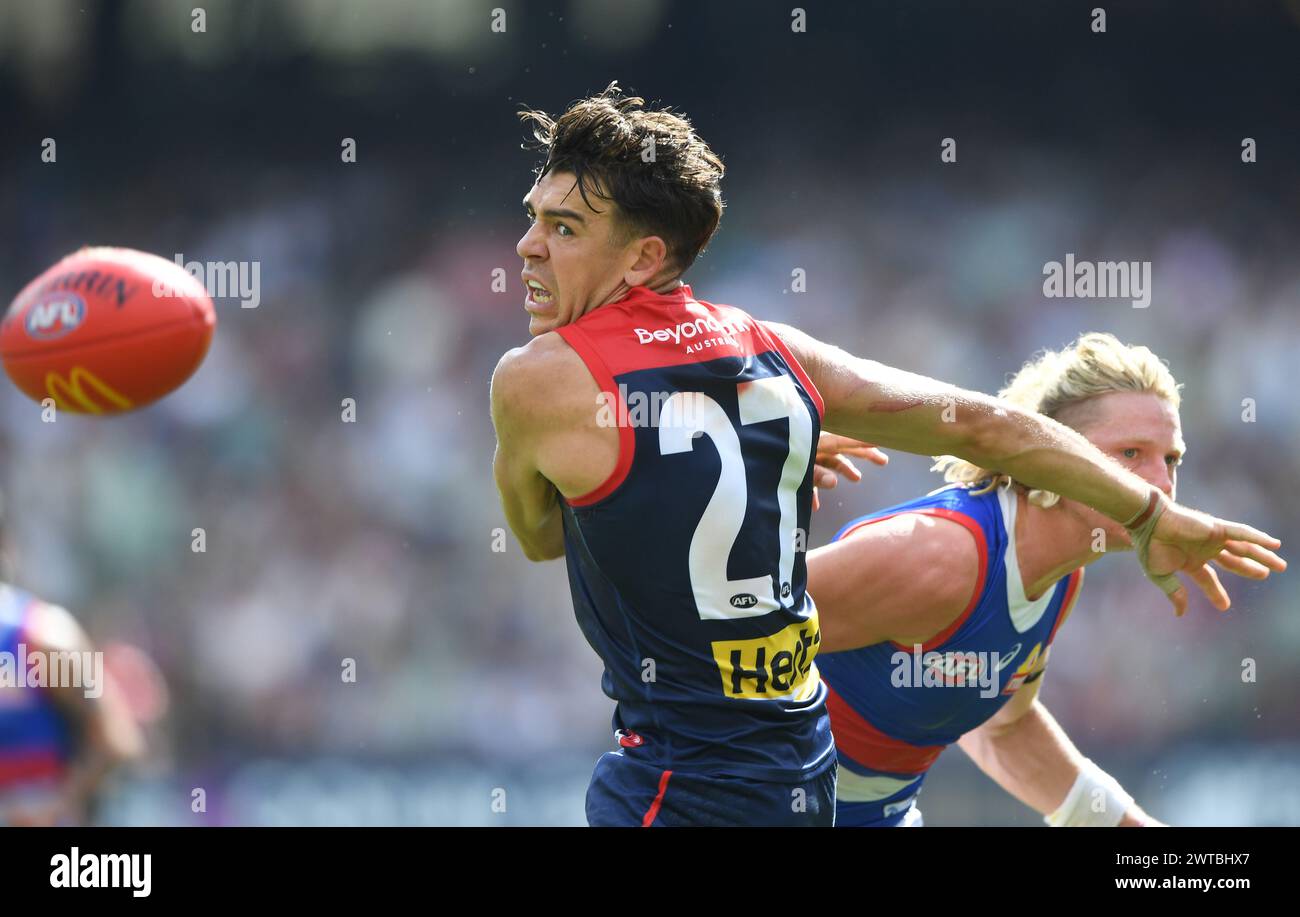 Melbourne, Australia. 17th Mar, 2024. Kade Chandler of the Demons (left ...