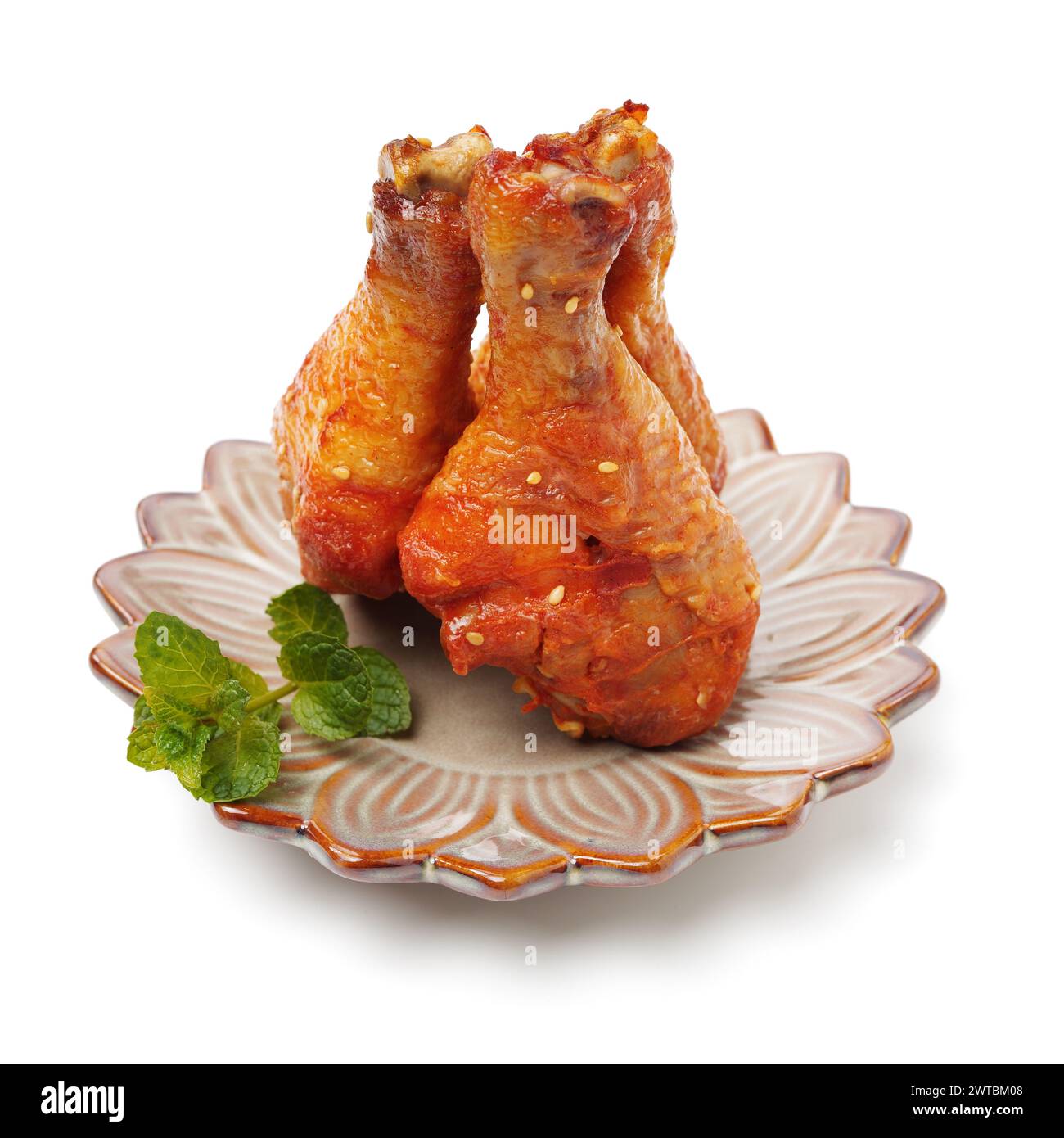 grilled chicken leg on white background Stock Photo - Alamy