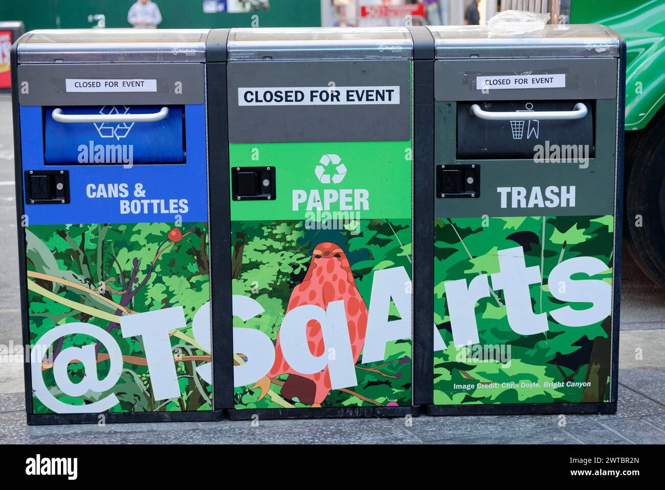 Recycling stations for cans, paper and rubbish with street art on the ...