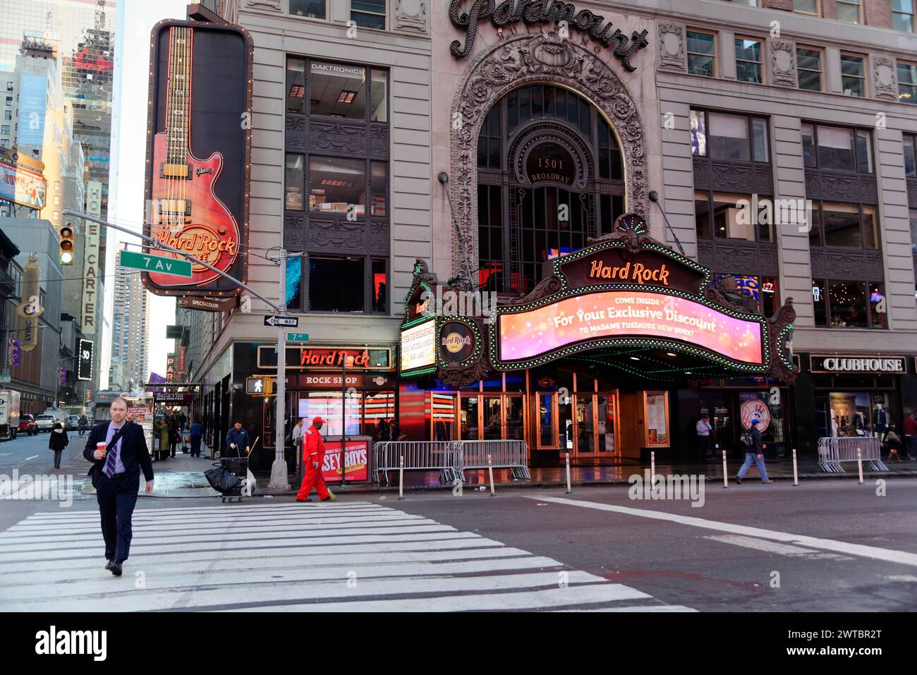 View of the Hard Rock Cafe in Times Square with passers-by on the ...