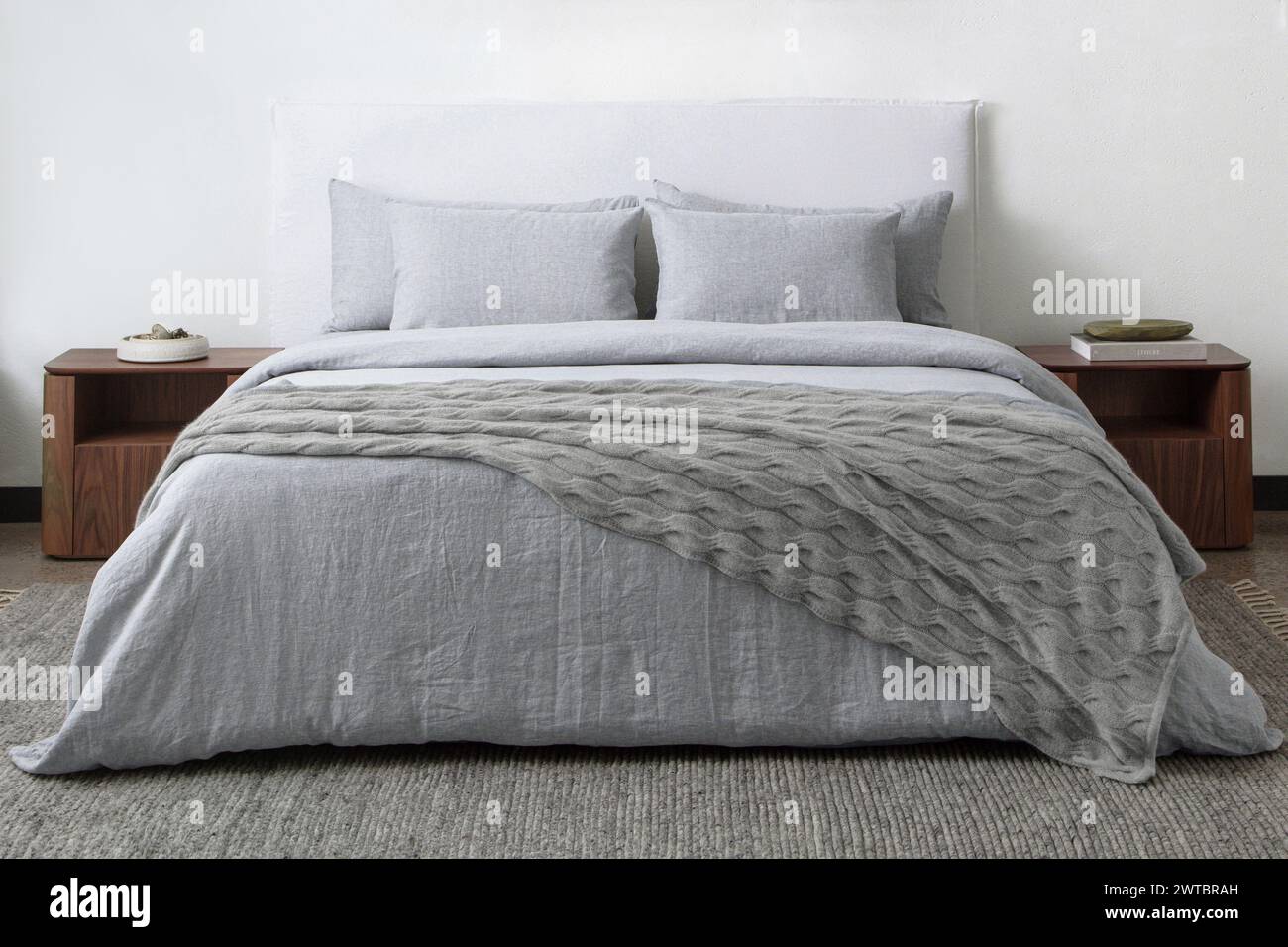 comfortable bed with pillows in contemporary room. interior design wall ...