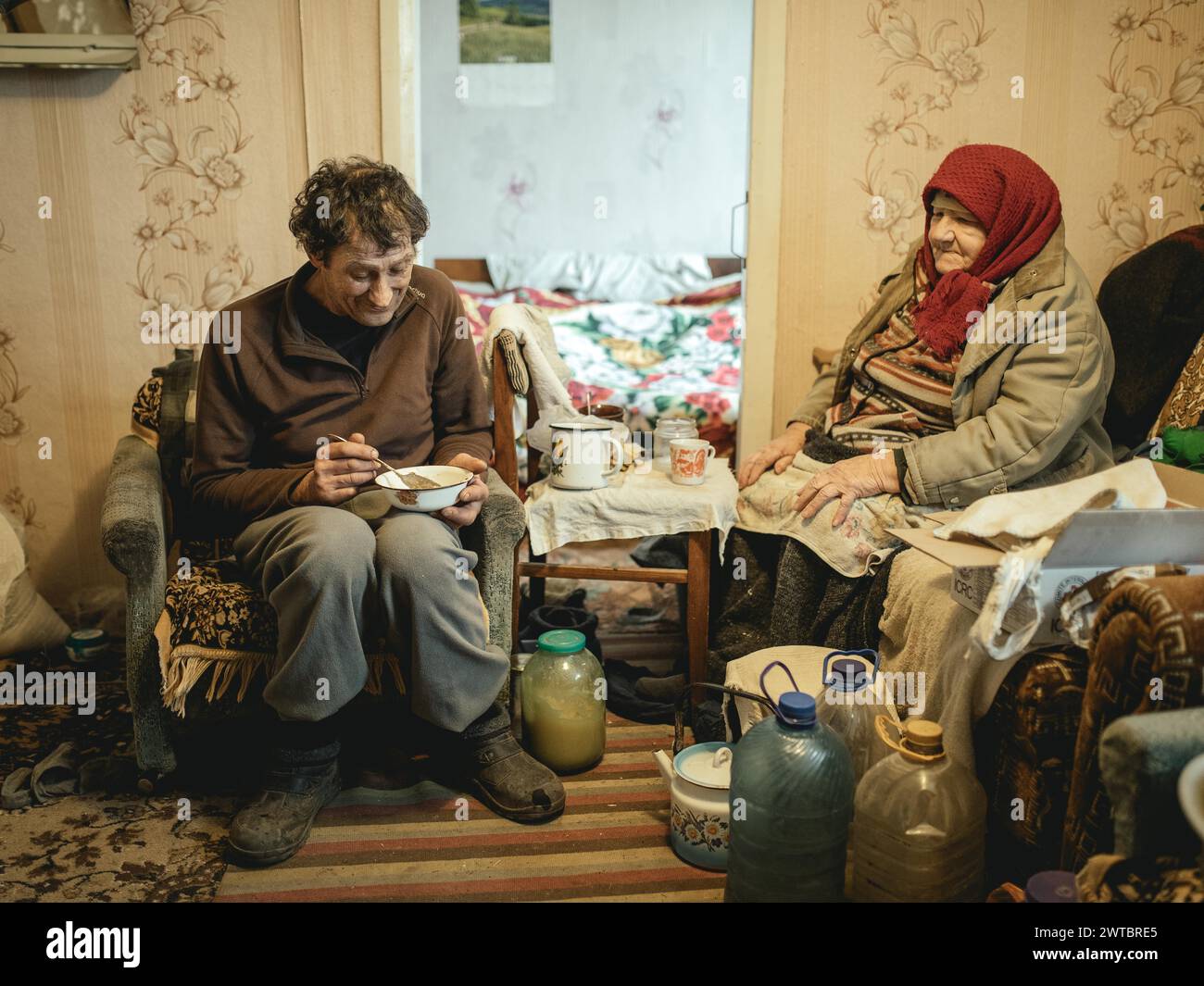 Varvara, 85, and her son Leonid, 56. Leonid looks after his mother, who ...