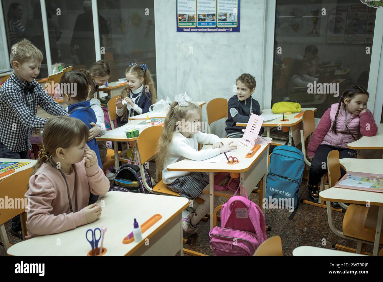 Pupils in a classroom in one of the metro schools in Kharkiv ...