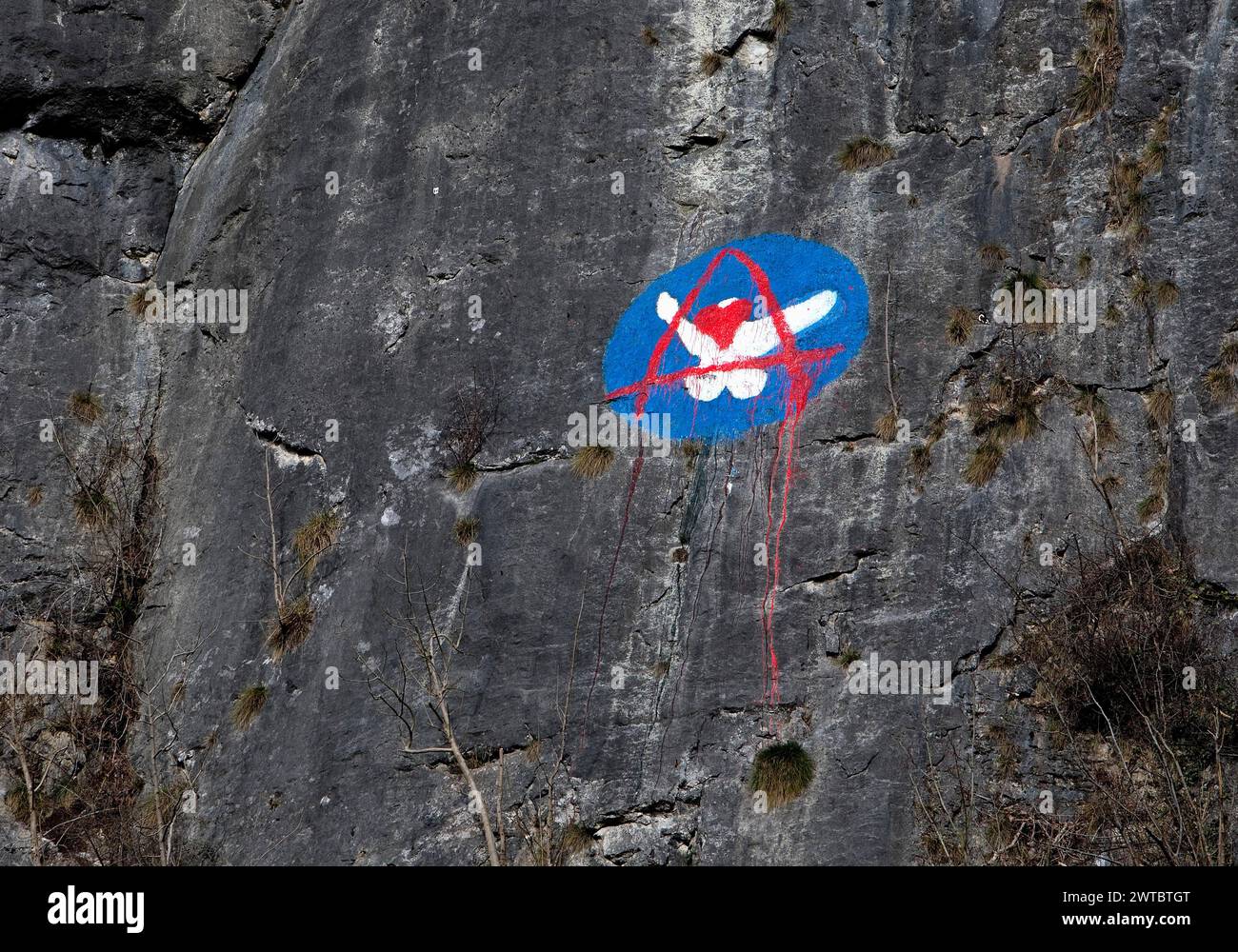 Steep rock face made of mass limestone with painting, Hoennetal, Balve ...