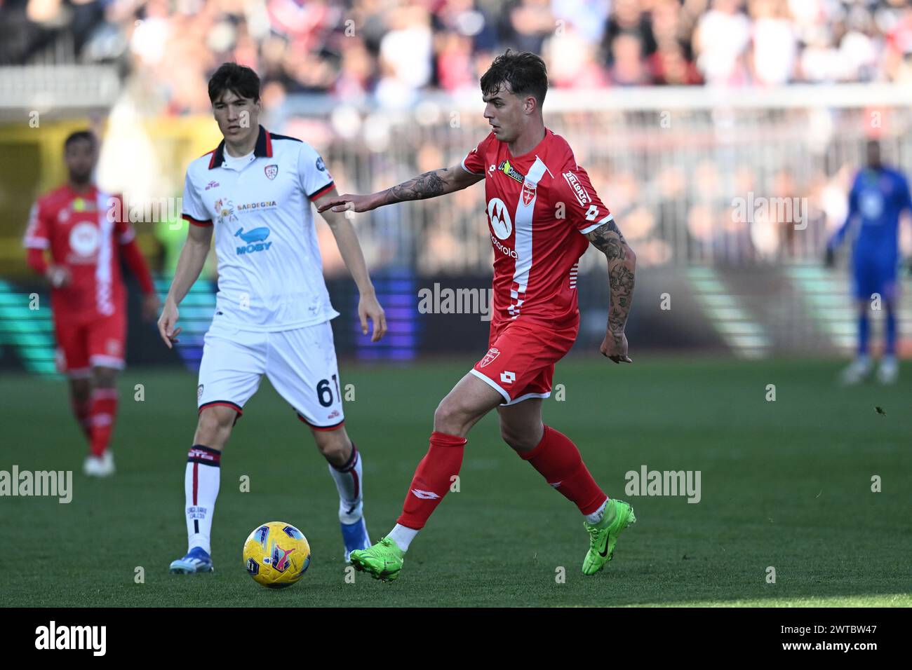 Eldor Shomurodov (Cagliari)Daniel Maldini (Monza) during the Italian ...