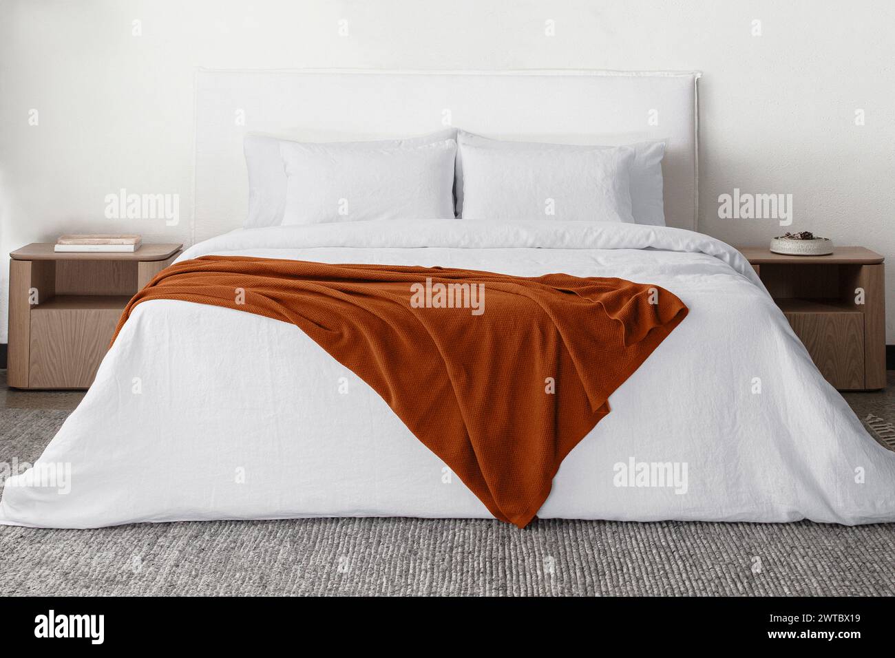 comfortable bed with pillows in contemporary room. interior design wall ...