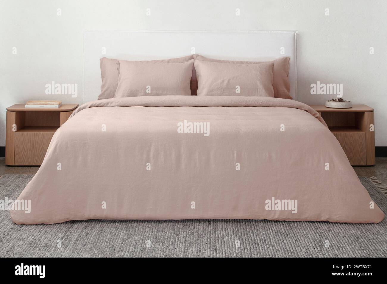 comfortable bed with pillows in contemporary room. interior design wall ...