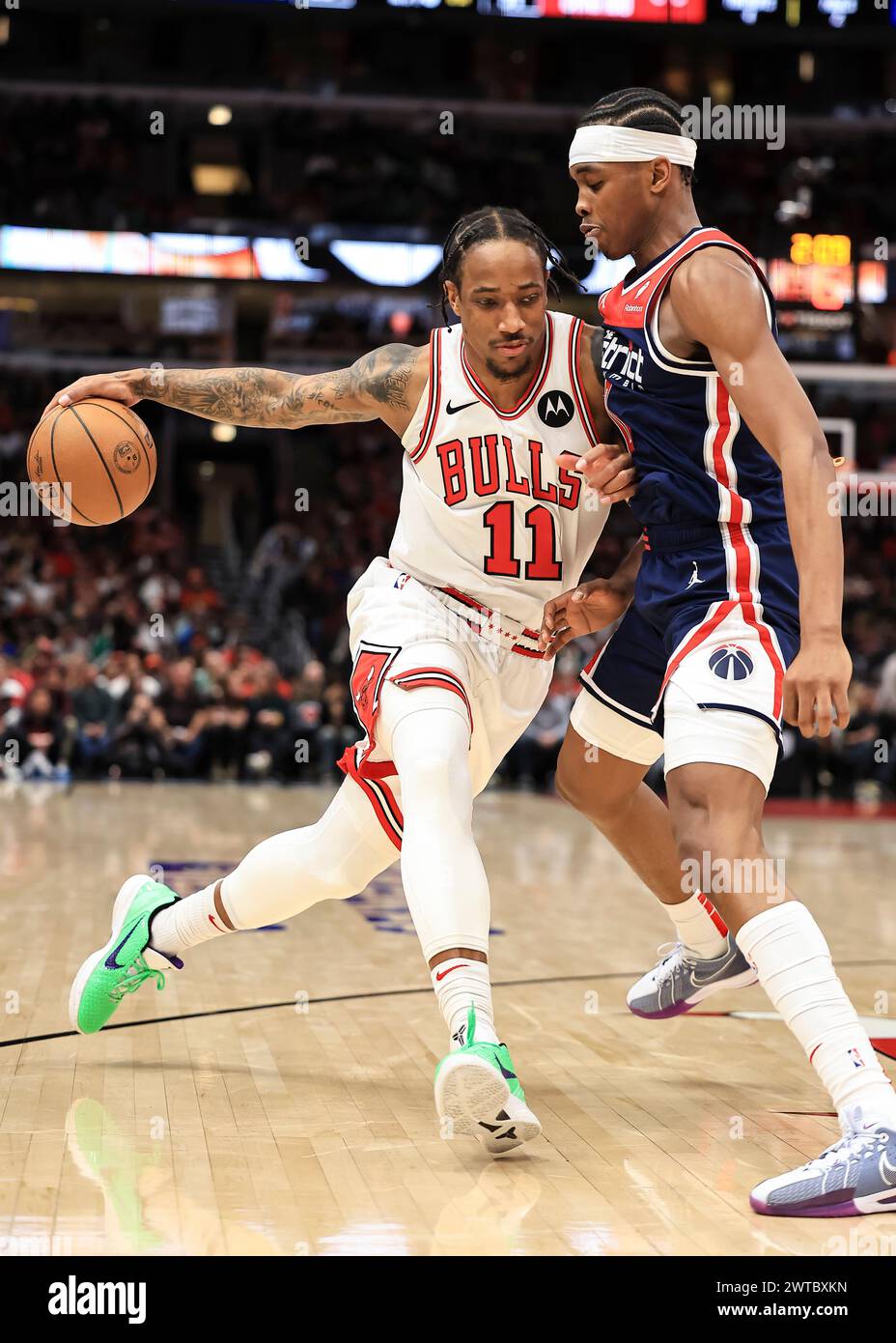 Chicago, USA. 16th Mar, 2024. Chicago Bulls' Ayo Dosunmu (L) breaks ...