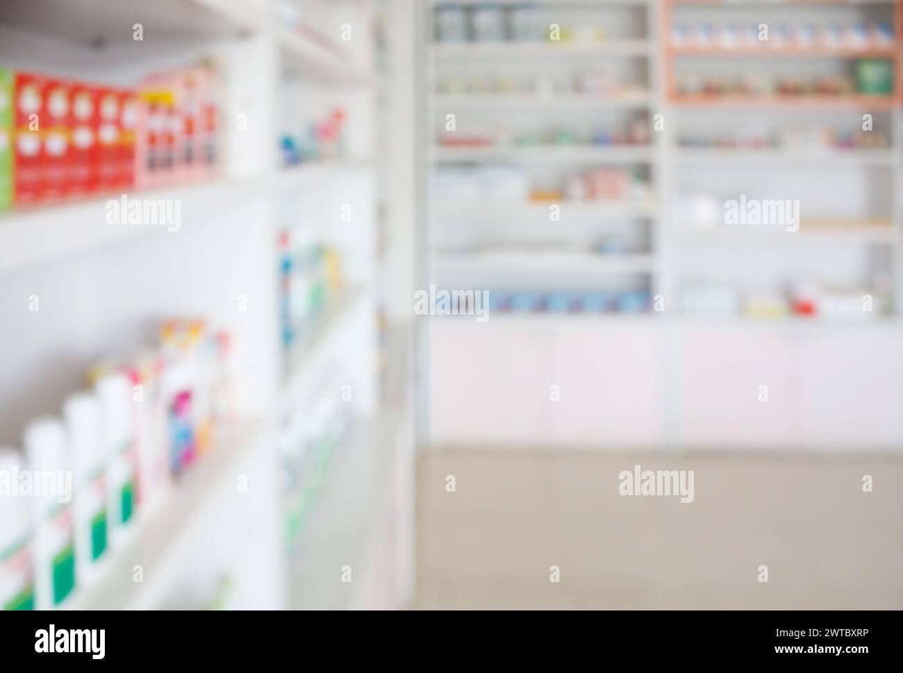 pharmacy shelves filled with medication blur background Stock Photo - Alamy
