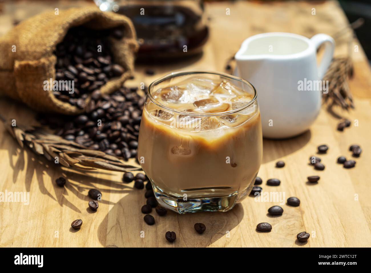 Cold Drink. Iced Coffee latte with Milk in nature Stock Photo - Alamy