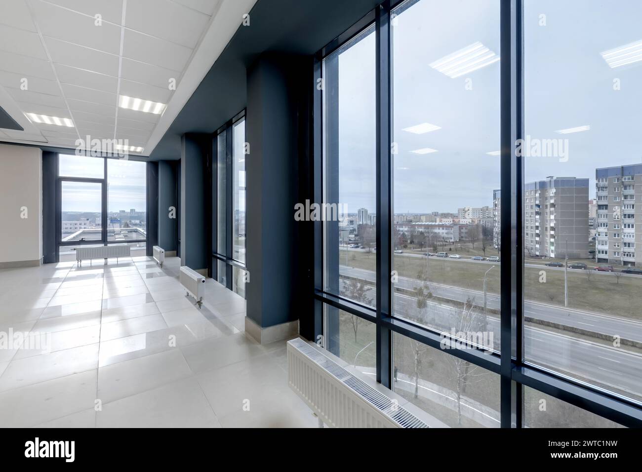 panorama view in empty modern hall with columns, doors , stairs and ...