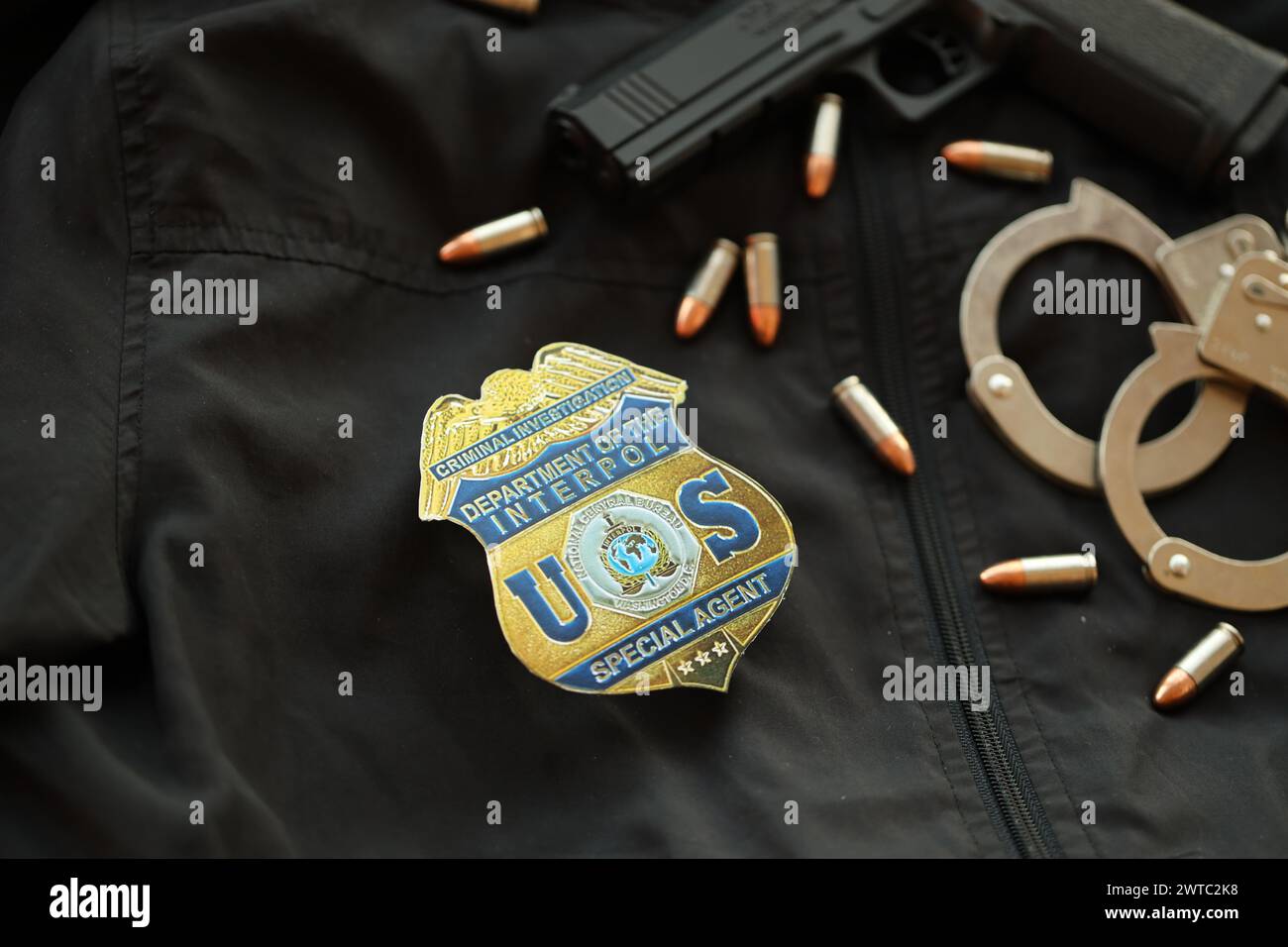 KYIV, UKRAINE - MARCH 9, 2024 US Interpol Special Agent badge on black ...