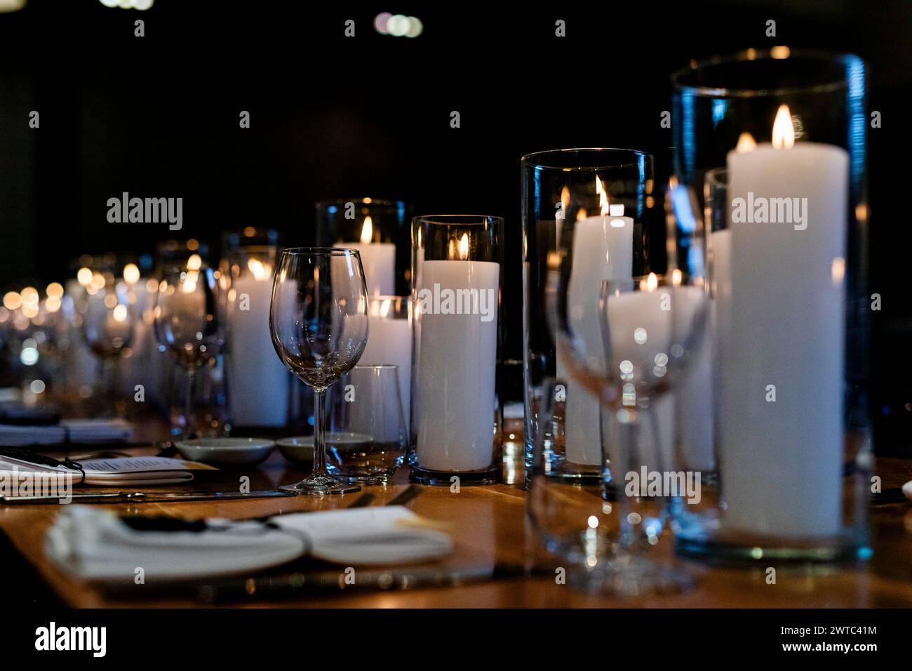 Luxury table settings for fine dining with and glassware, pouring wine ...