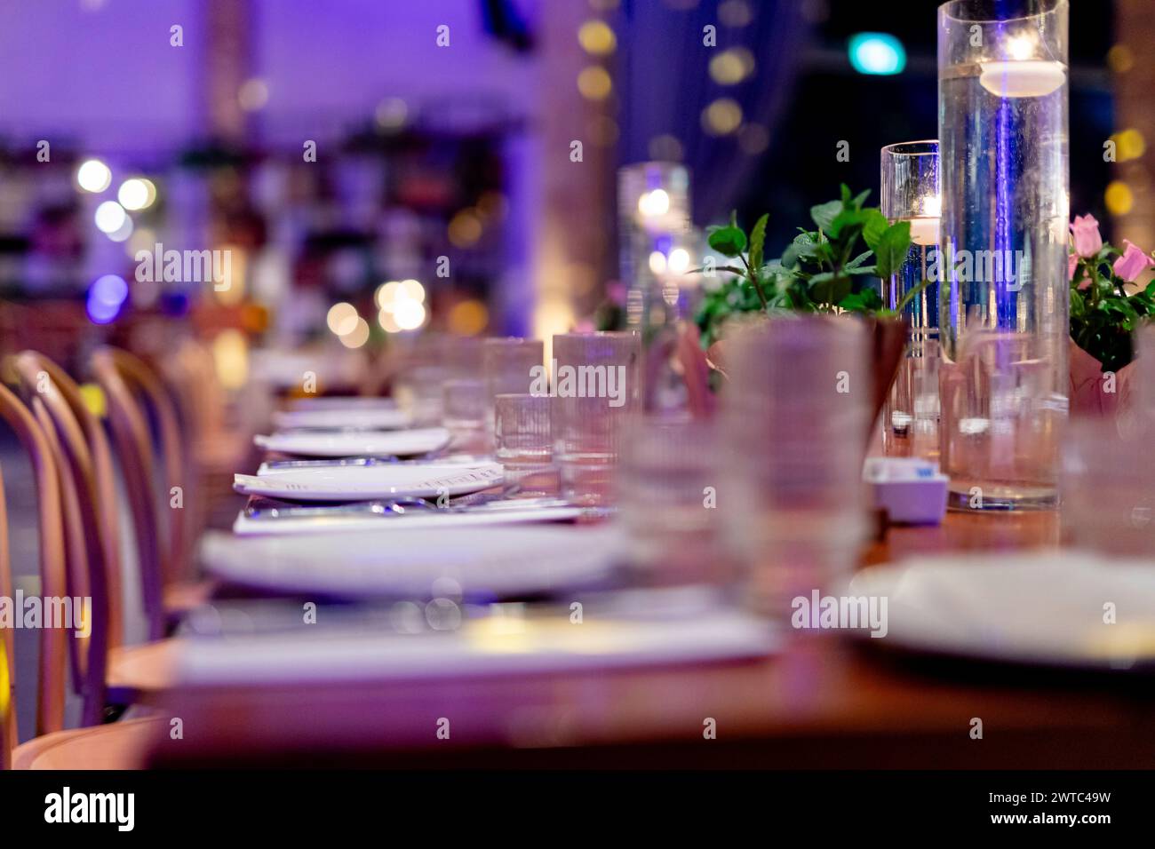 Luxury table settings for fine dining with and glassware, pouring wine ...