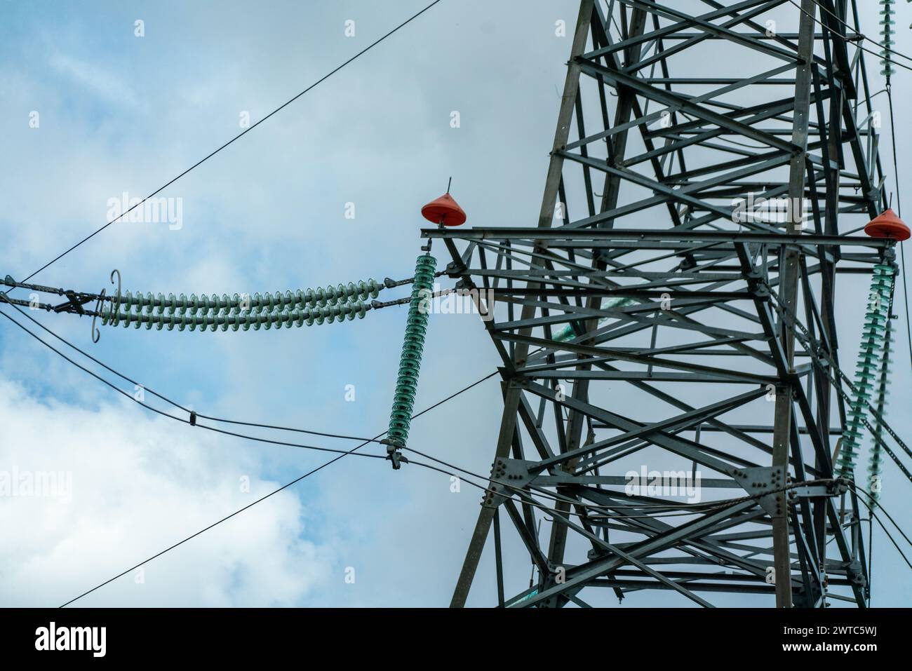 High voltage towers with sky background. Power line support with wires ...