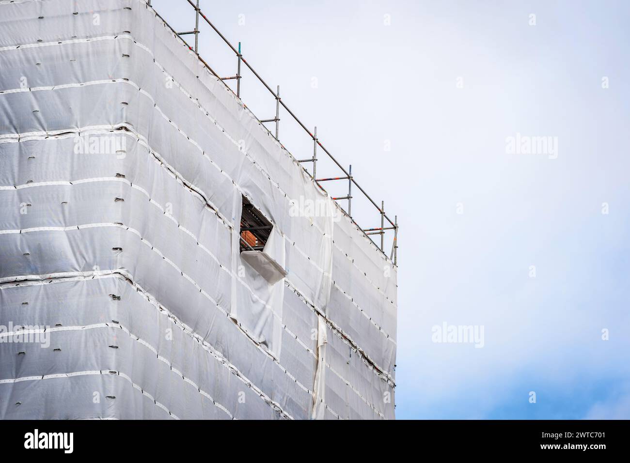 Flame retardant scaffold sheeting wrapped apartments building during ...