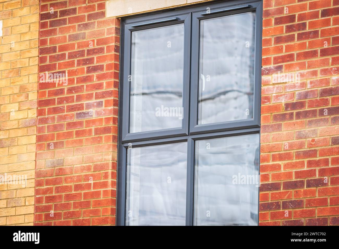 Window view of construction aparments building site in england uk Stock ...
