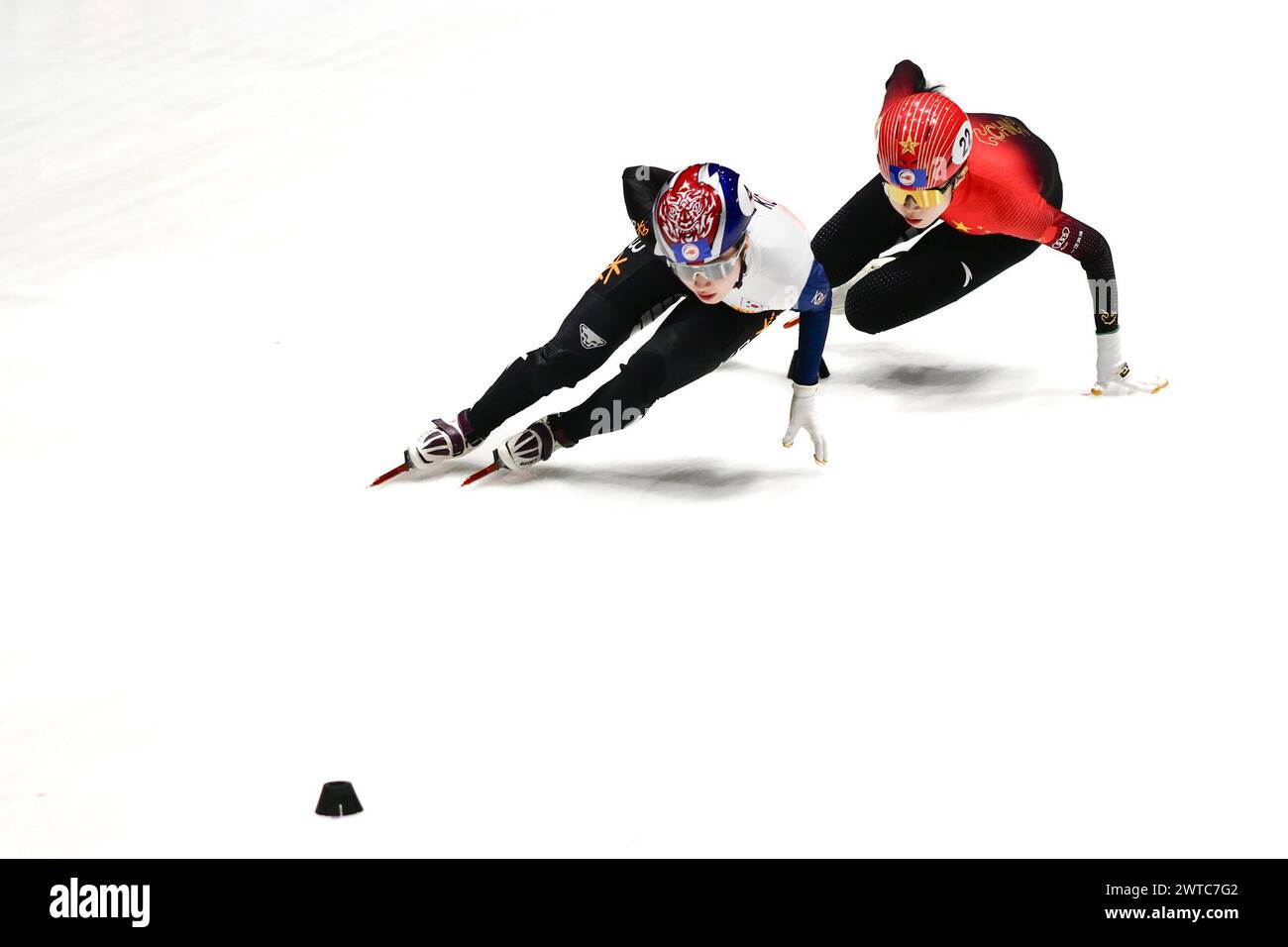 KIM Gilli KOR leads GONG Li CHN during the World Short Track Speed ...