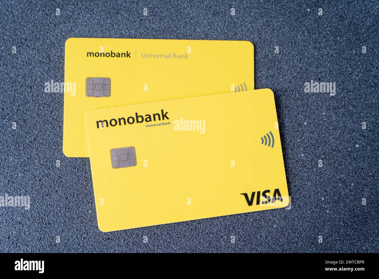 Credit card of the Ukrainian bank Monobank from Universal Bank. Yellow Visa card with chip ...