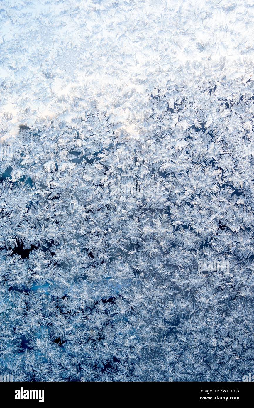 frozen window glass closeup of city house on cold winter twilight Stock ...