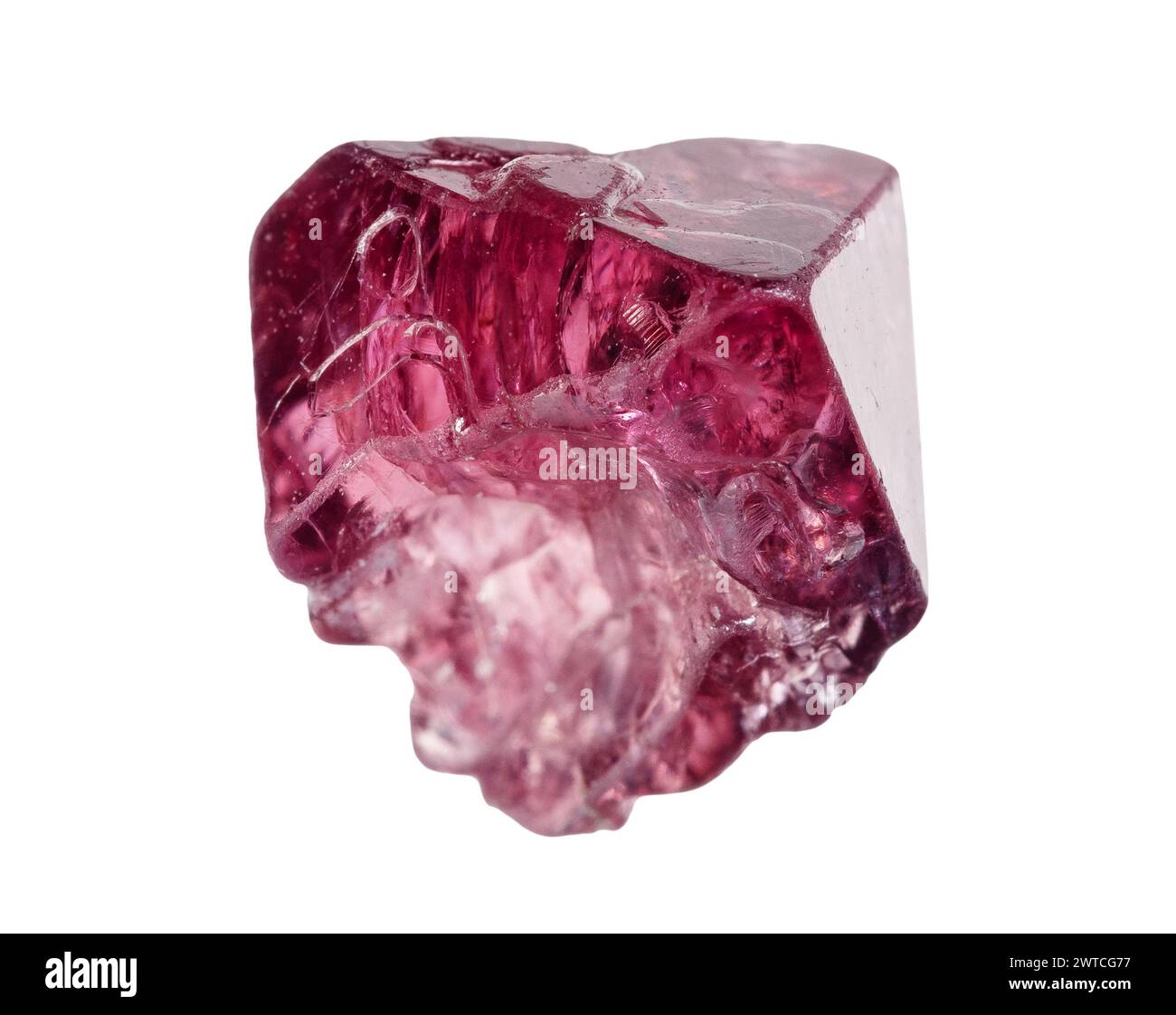 specimen of natural rough red spinel crystal cutout on white background ...