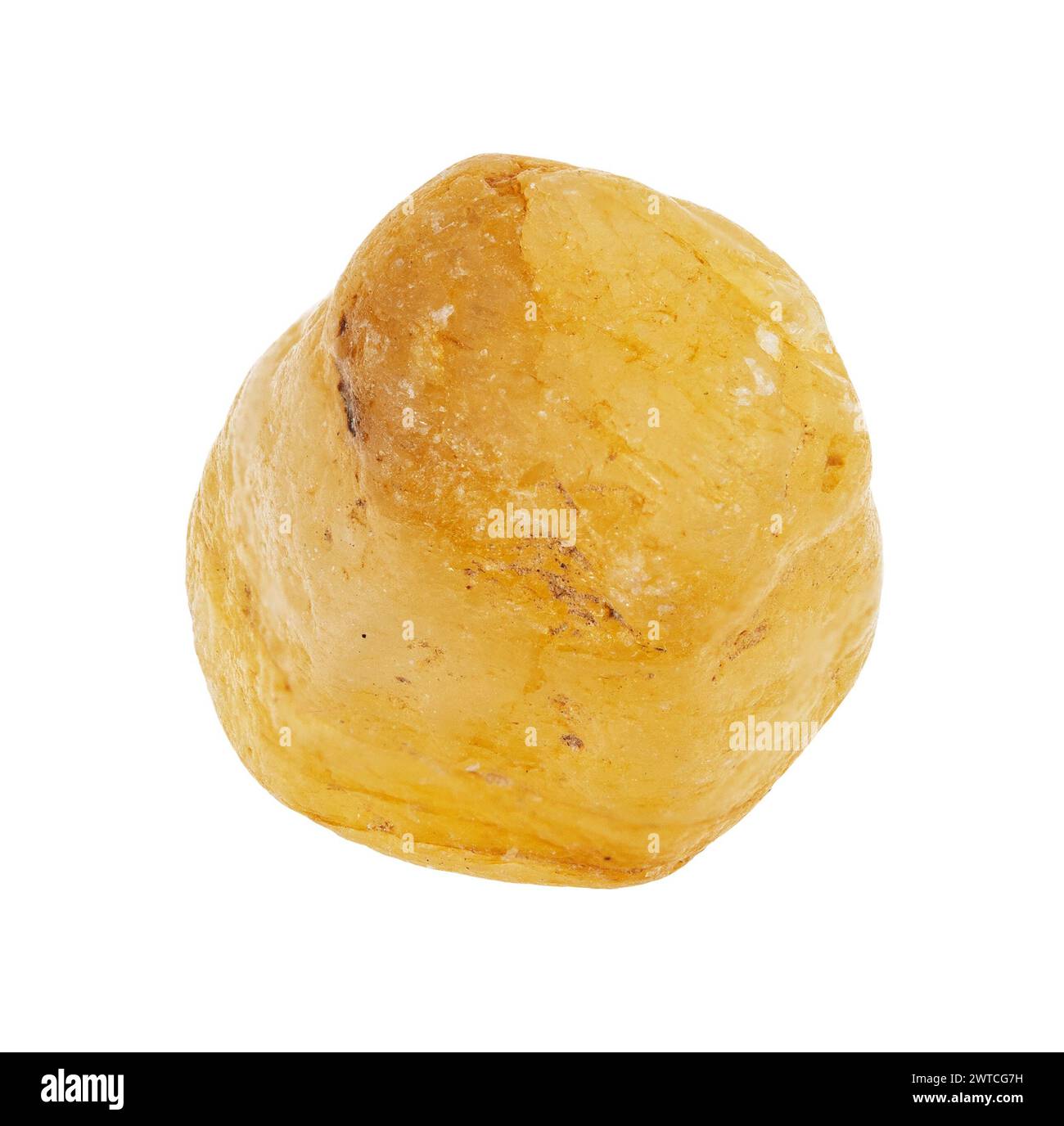 specimen of natural rough yellow sapphire crystal cutout on white ...