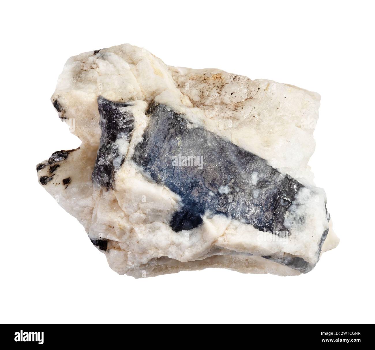 specimen of natural raw blue corundum sapphire in rock cutout on white ...