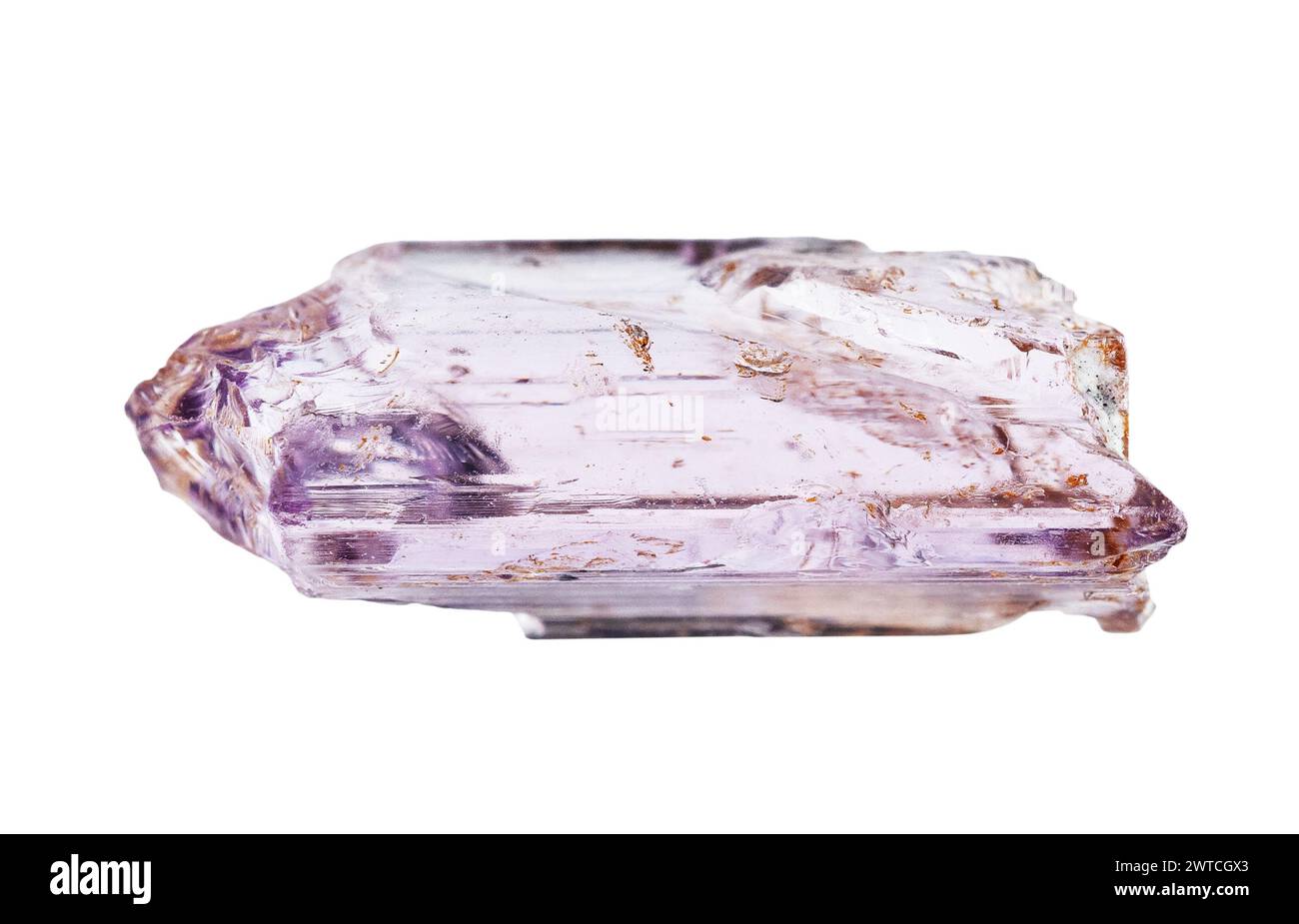specimen of natural raw purple scapolite crystal cutout on white ...