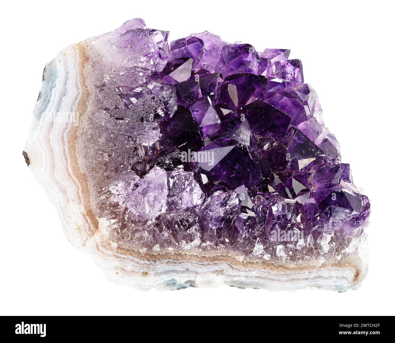 specimen of natural piece of geode of amethyst crystals cutout on white ...
