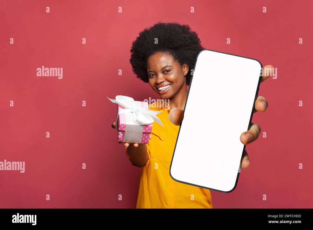 Beautiful woman holds empty blank screen display phone. Female with ...