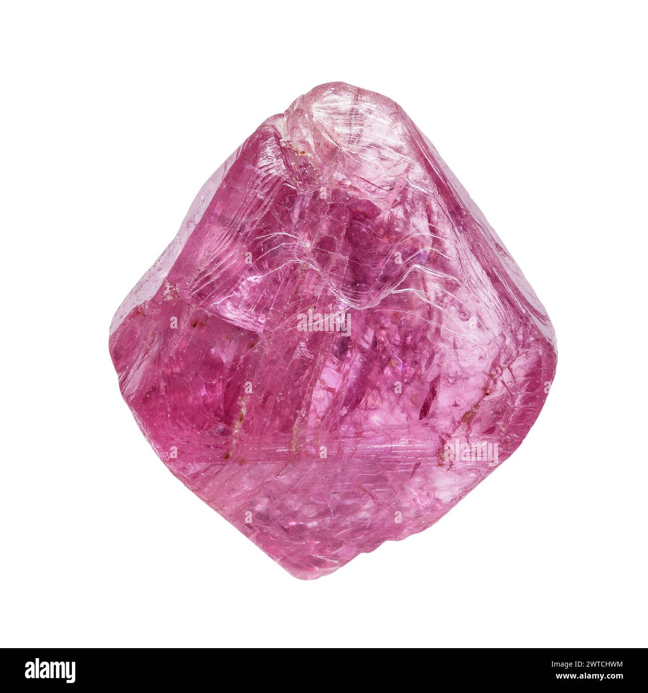 specimen of natural raw pink spinel crystal cutout on white background ...